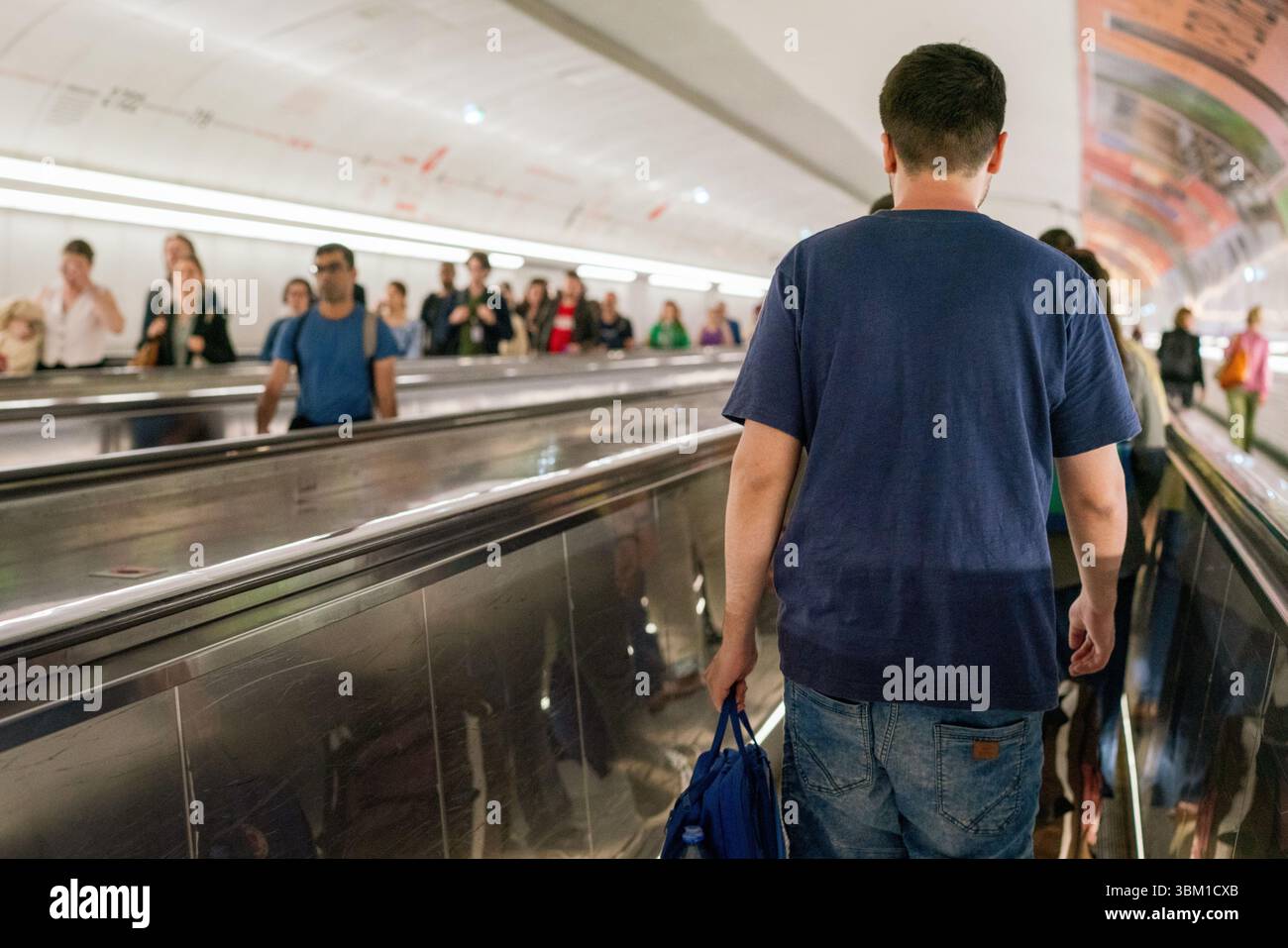Commuters wait in corridor hi-res stock photography and images - Alamy