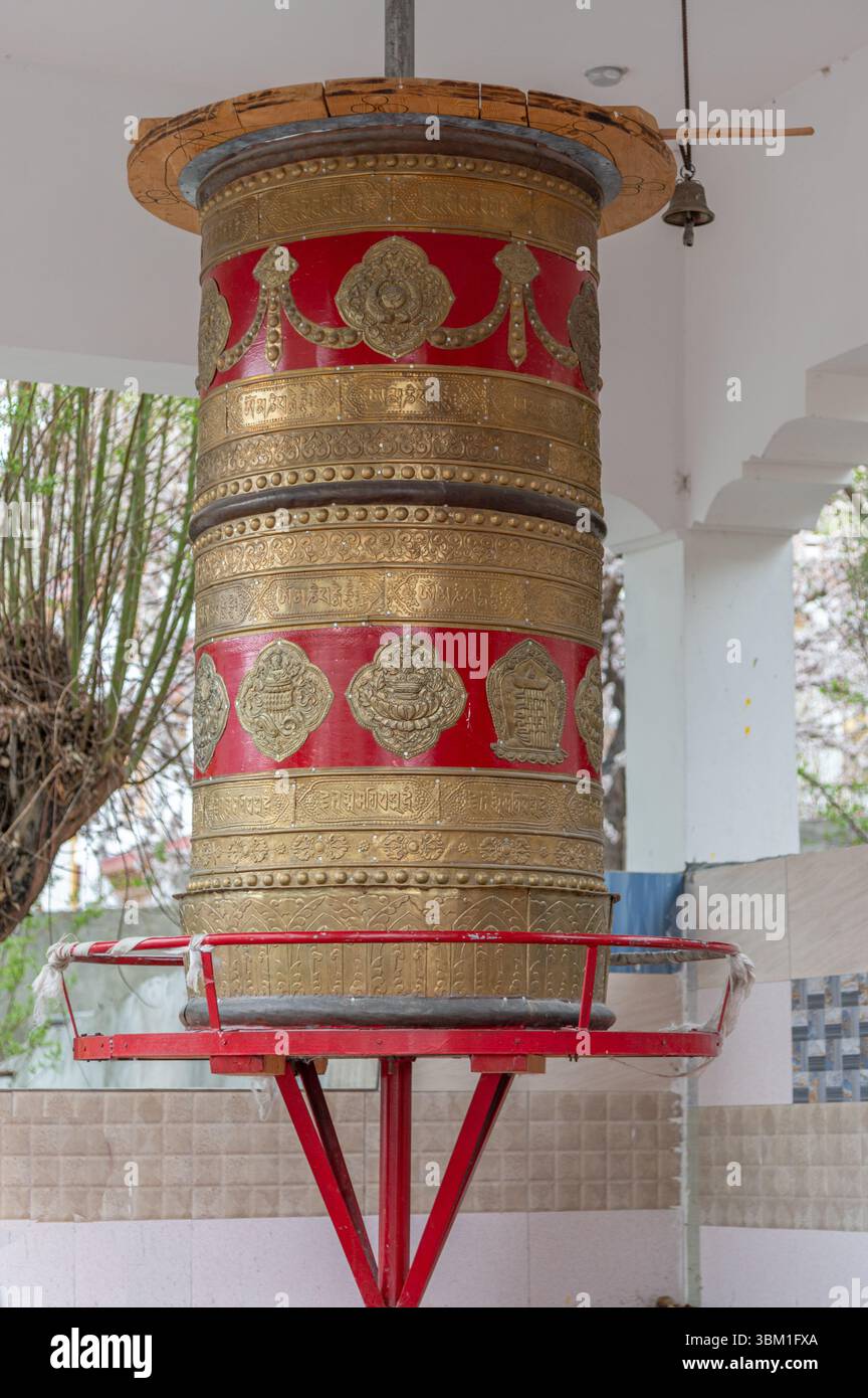 Close-up of a traditional Buddhist prayer wheel at Samstanling ...