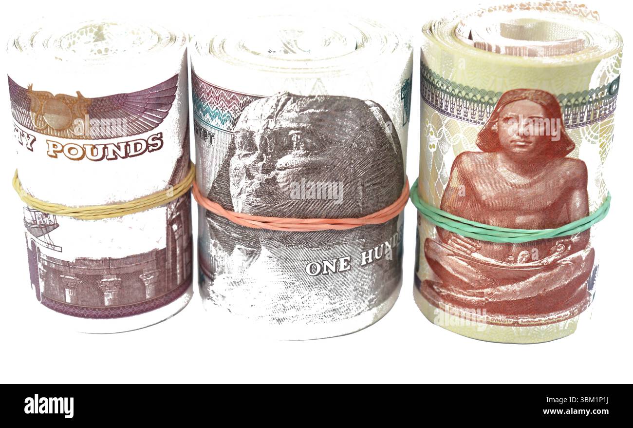 Rolls and bundles of Egyptian money of different values, 50LE, 100 EGP ...