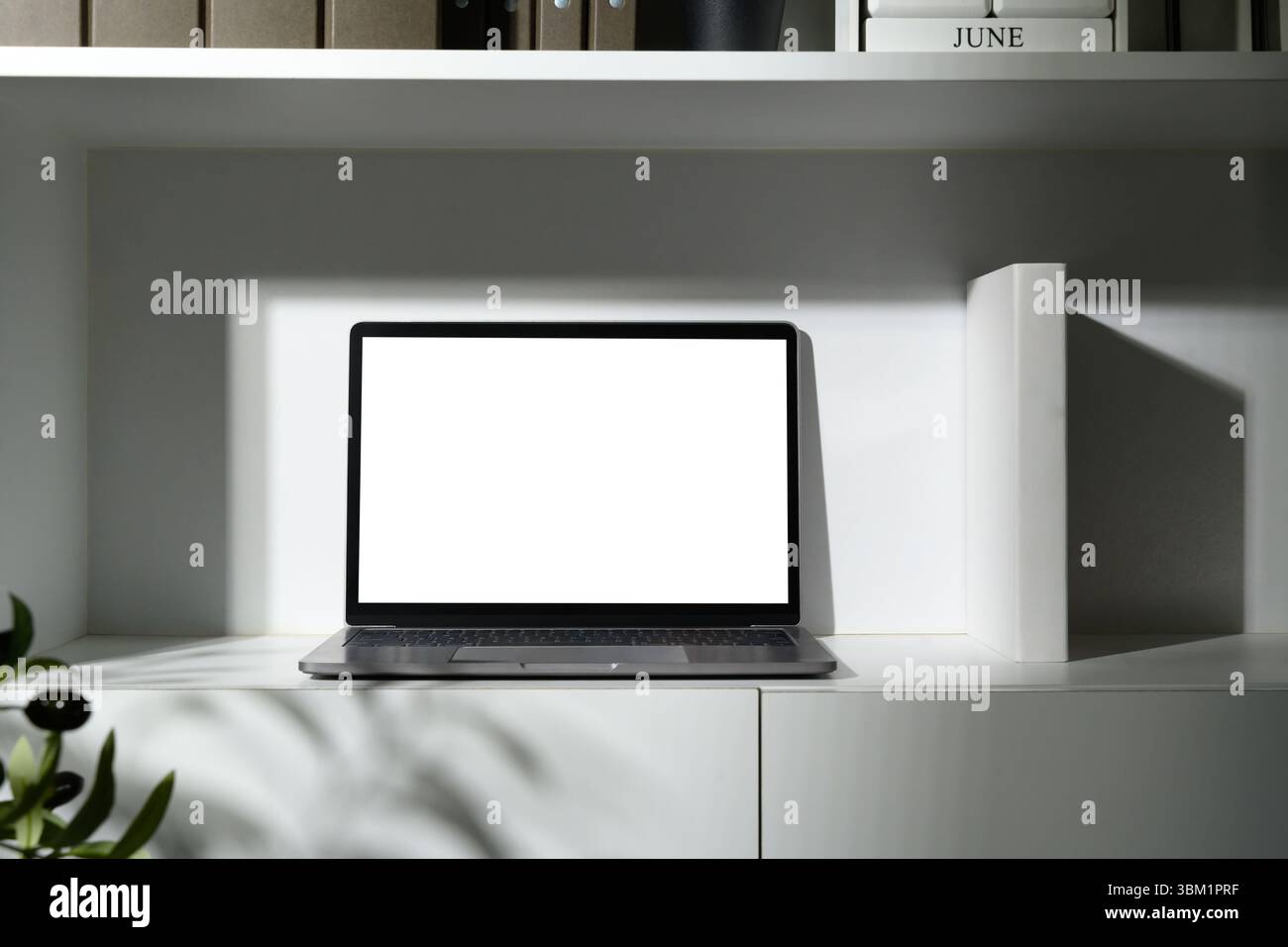 Front view of laptop mockup screen on modern white shelf Stock Photo ...