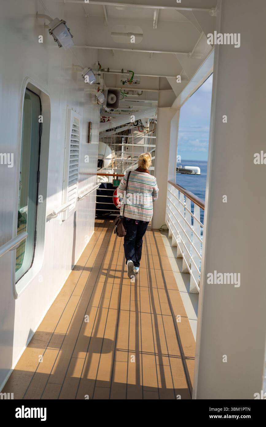 Woman walking on cruise hi-res stock photography and images - Alamy