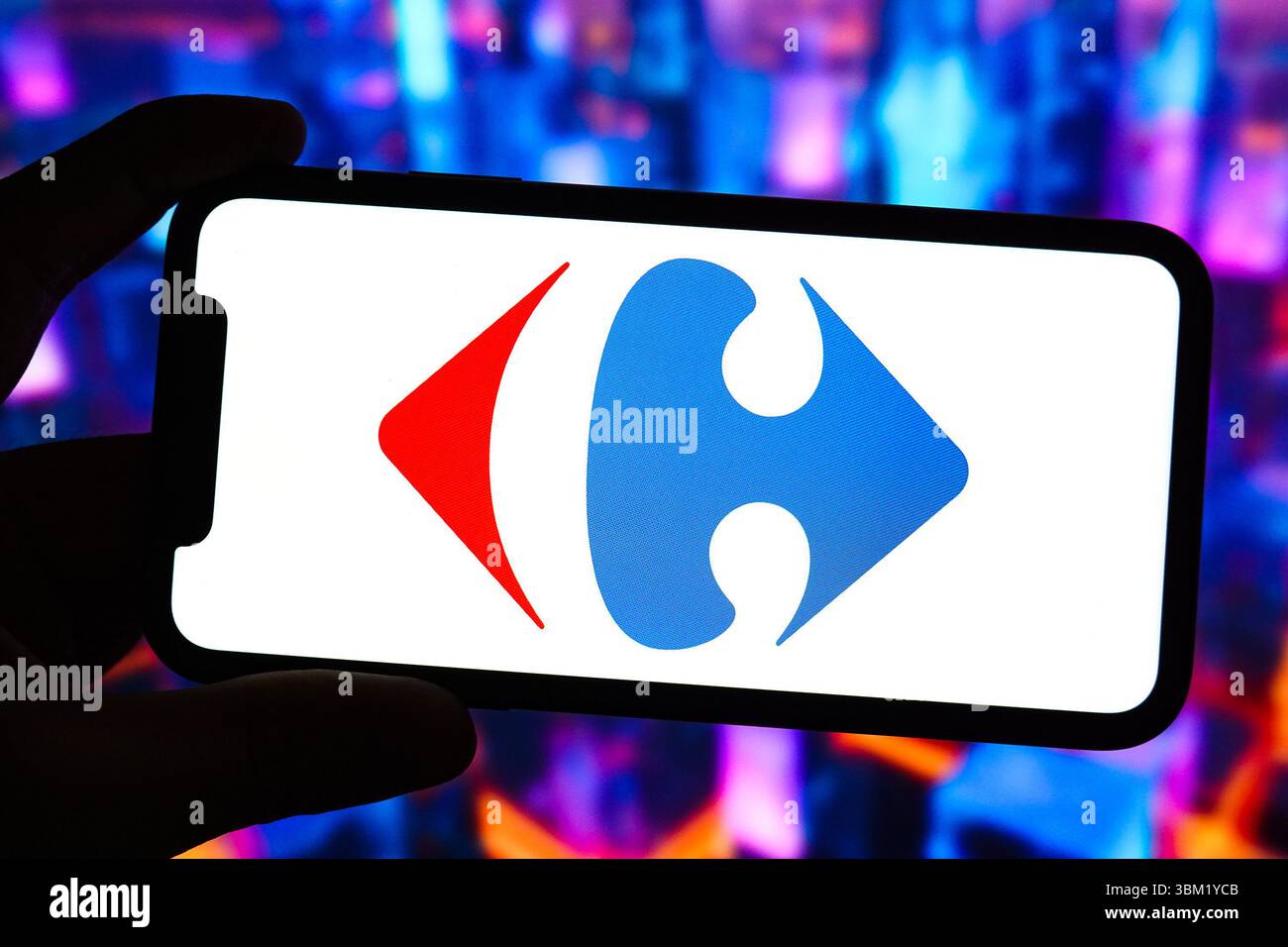 In this photo illustration, the logo of Carrefour is displayed on the ...