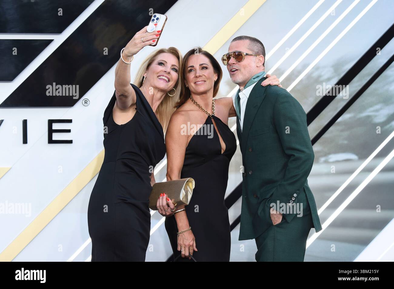 Rachel Brookes, Natalie Pinkham and Brad Pitt arriving for the “F1 ...