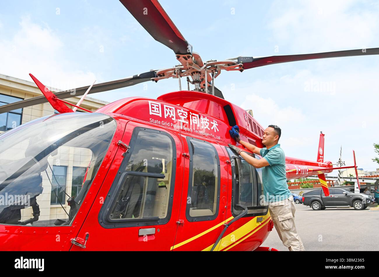 A helicopter is conducting aerial patrol and defect elimination ...