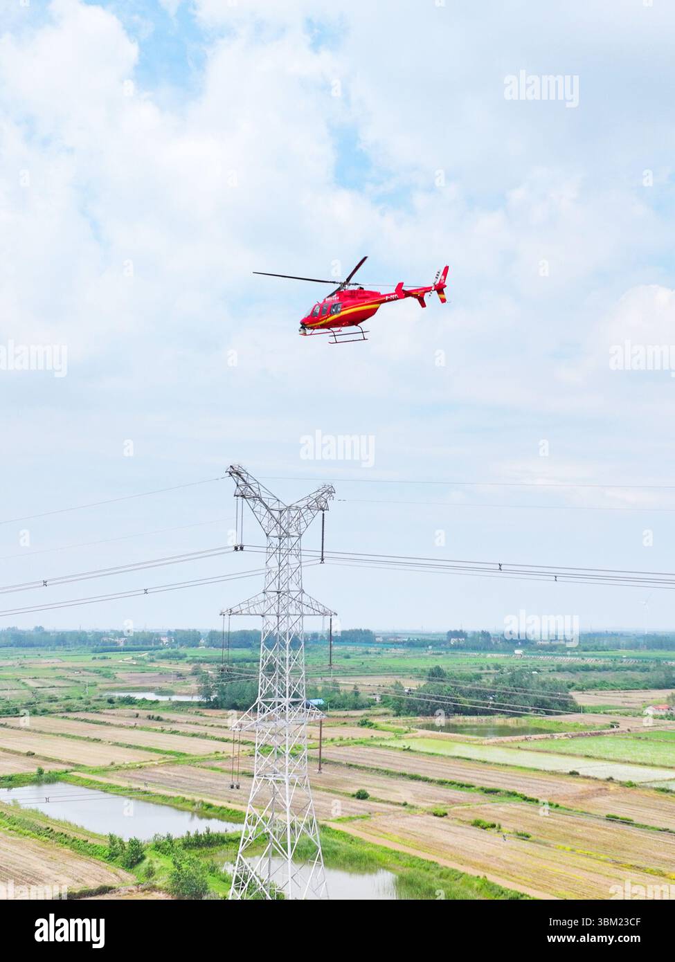 A helicopter is conducting aerial patrol and defect elimination ...
