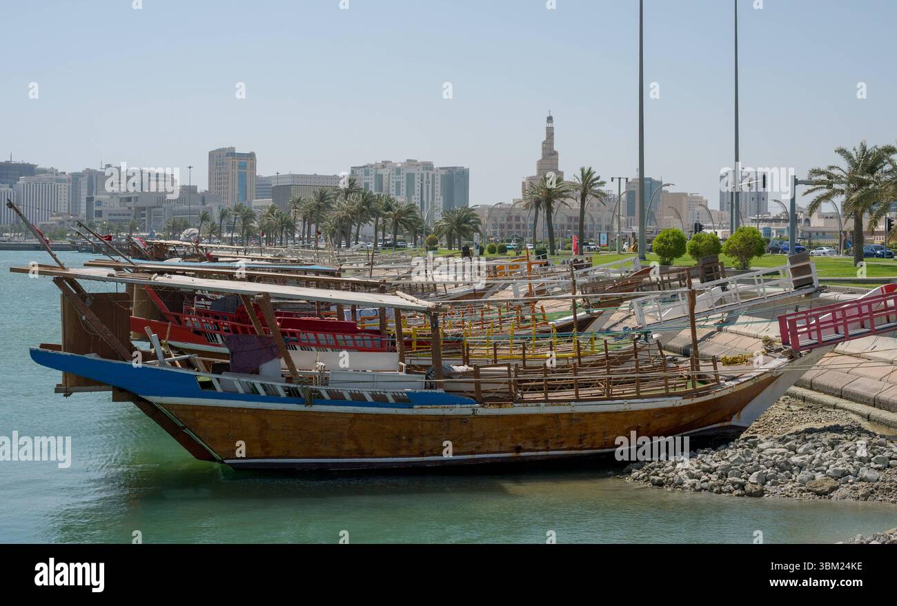 QATAR DAILY LIFE AFTER IRAN ATTACK Traditional boats anchored in front ...