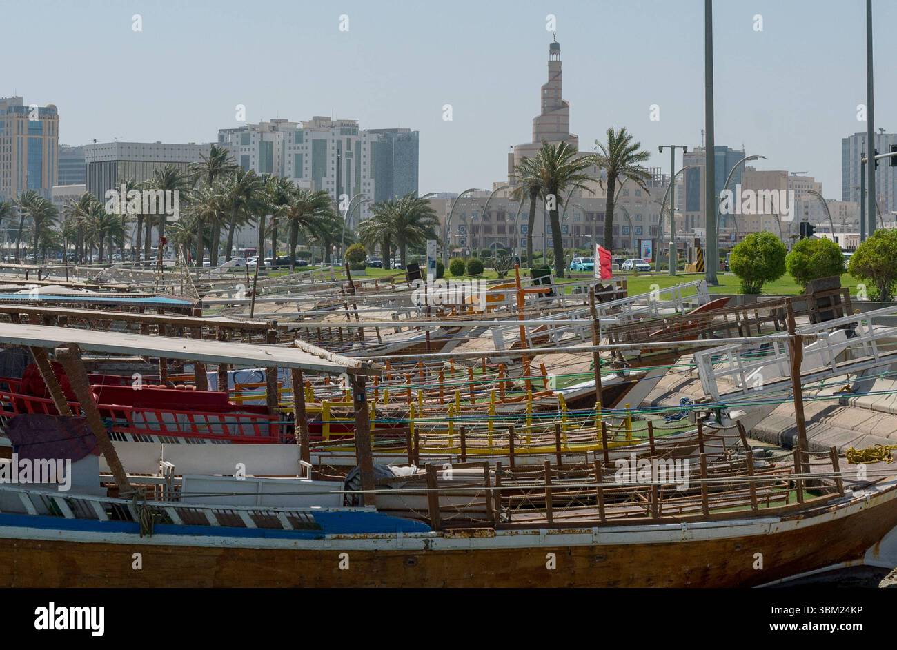QATAR DAILY LIFE AFTER IRAN ATTACK Traditional boats anchored in front ...