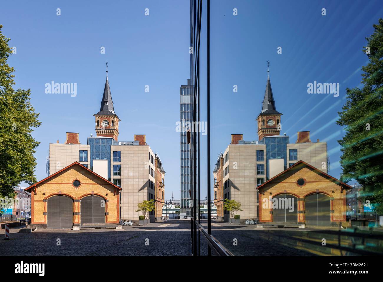 tower of the old harbor masters office with the modern outbuilding at ...