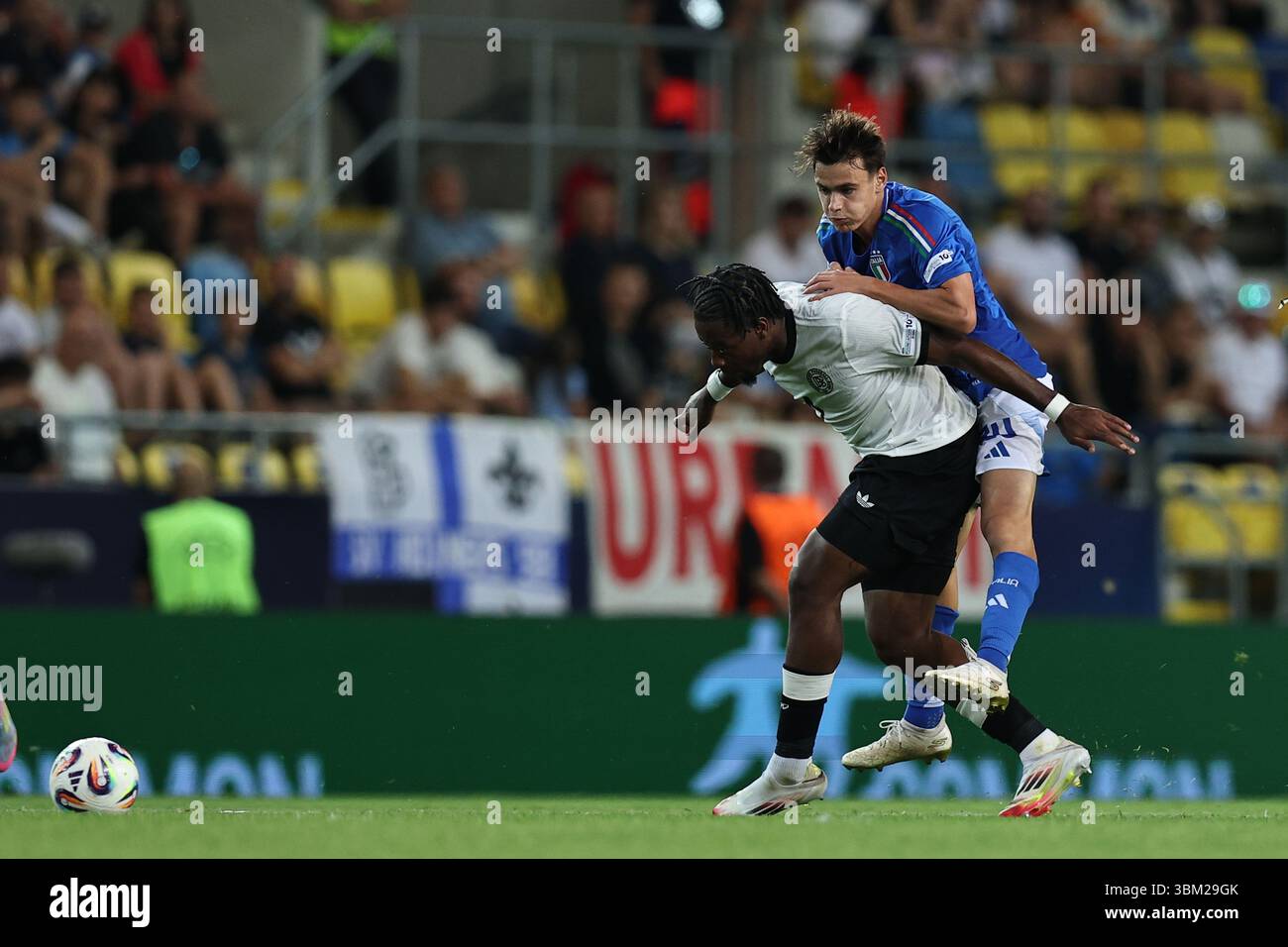 Bright Arrey-Mbi (Germany U21)Nicolo Pisilli (Italy U21) during the UEFA Under 21 Slovakia 2025 ...