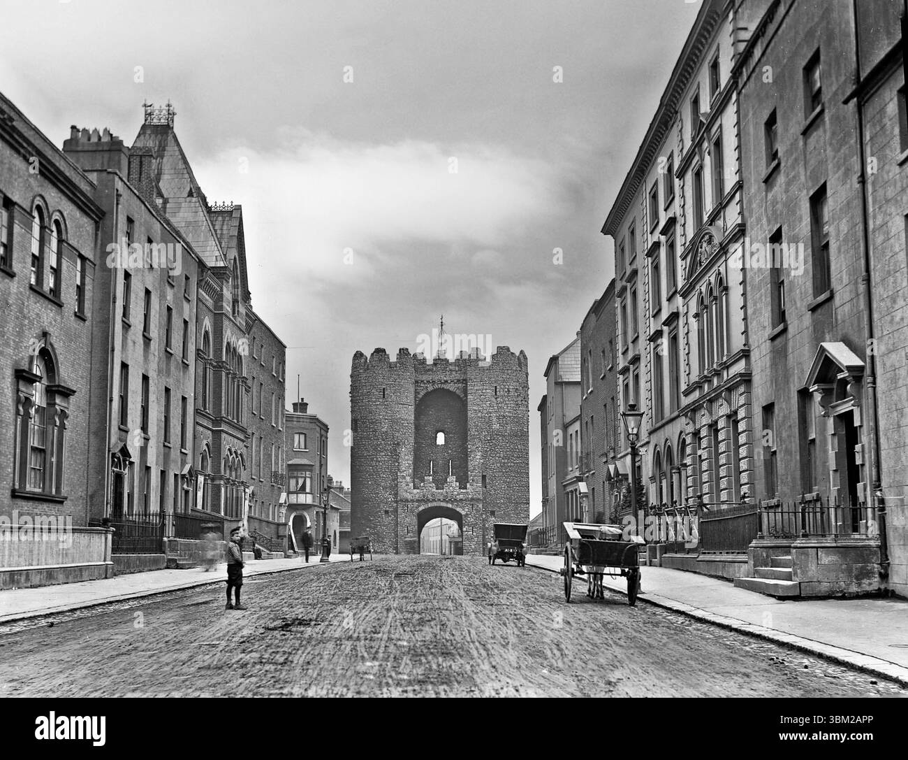 A late 19th-century photograph of St Lawrence Street and Lawrence Gate ...
