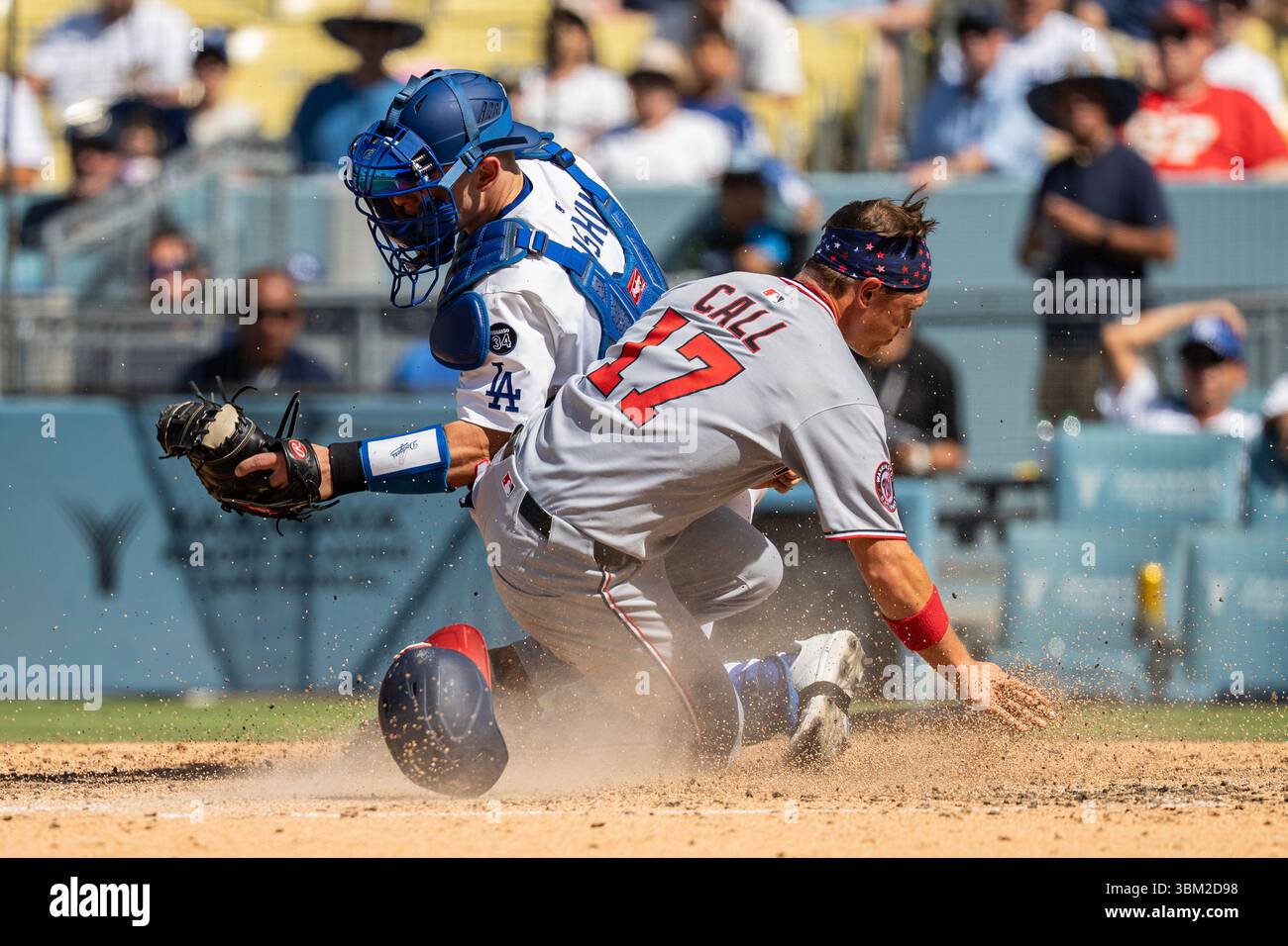 Washington Nationals outfielder Alex Call (17) slides safely into home ...