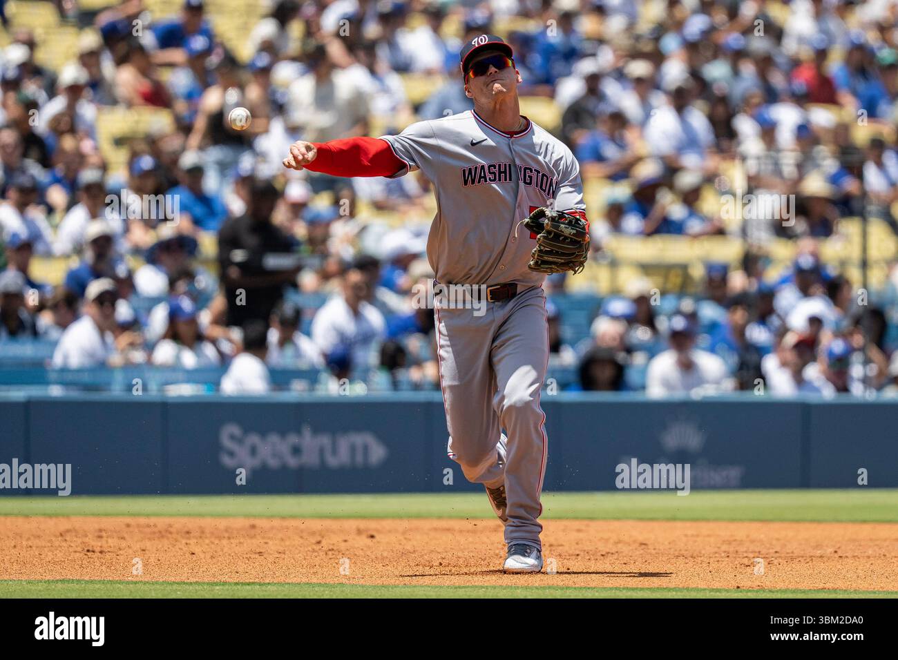 Washington Nationals third base Brady House (55) throws to first base ...