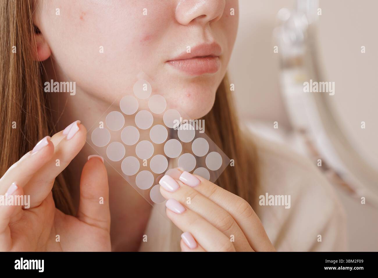 Acne breakout solution applying hi-res stock photography and images - Alamy