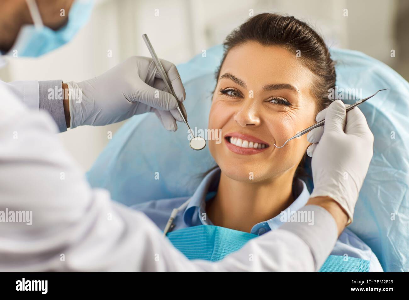 Dentist exam, teeth, gums, dental care exam, happy smiling woman ...