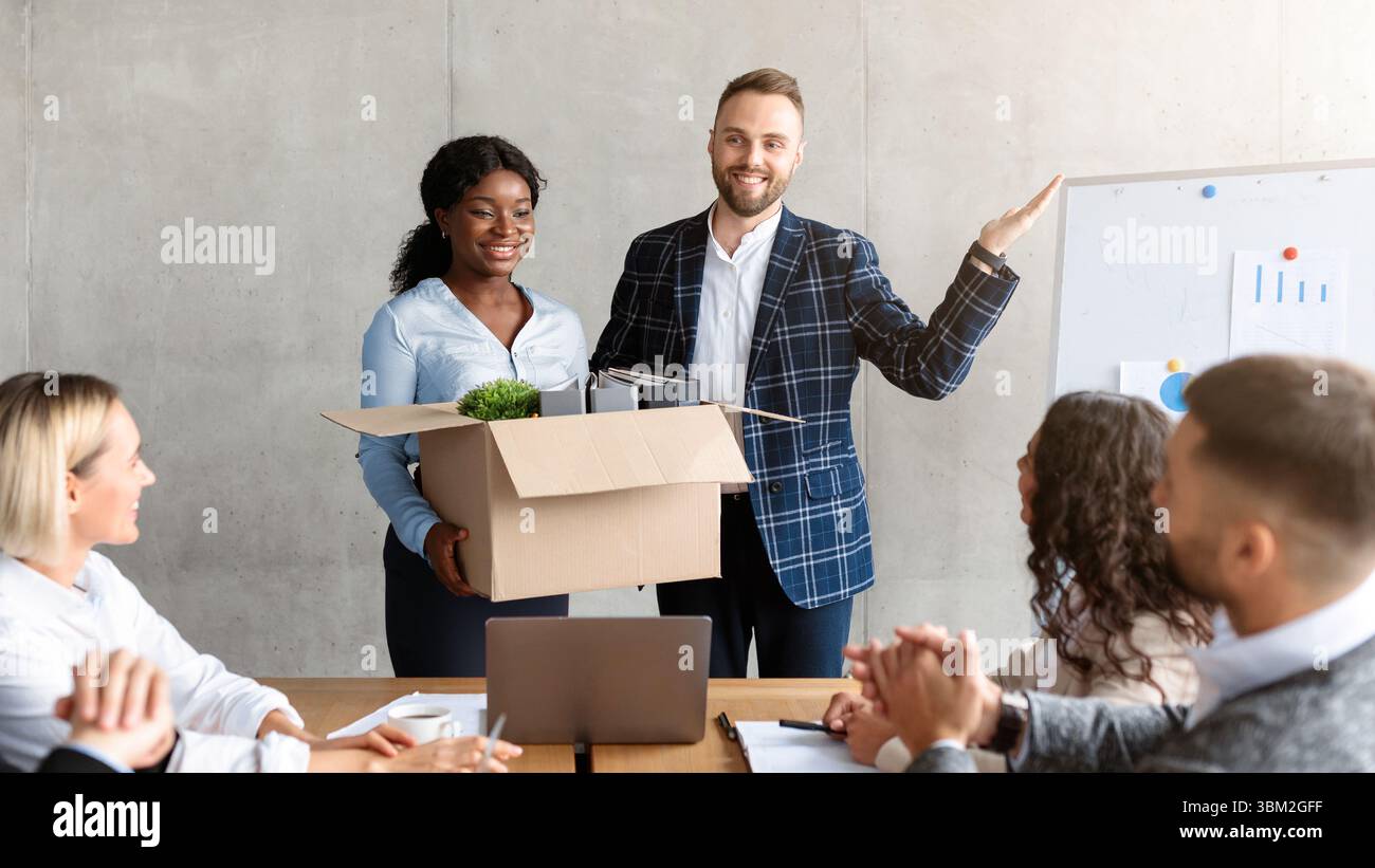HR Manager Introducing New Female Employee To Colleagues In Office ...