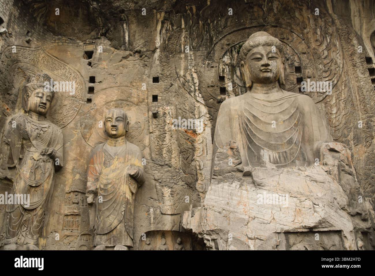 Buddhist Statues Carved into the Rock at Longmen Grottoes in Luoyang ...