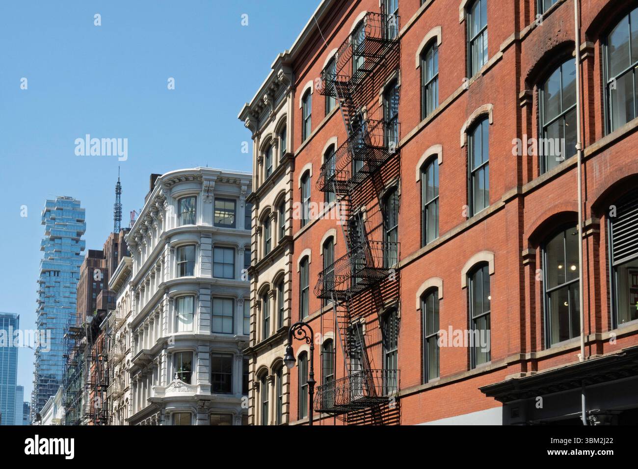 Greene Street in the historical District of Soho features cast-iron ...