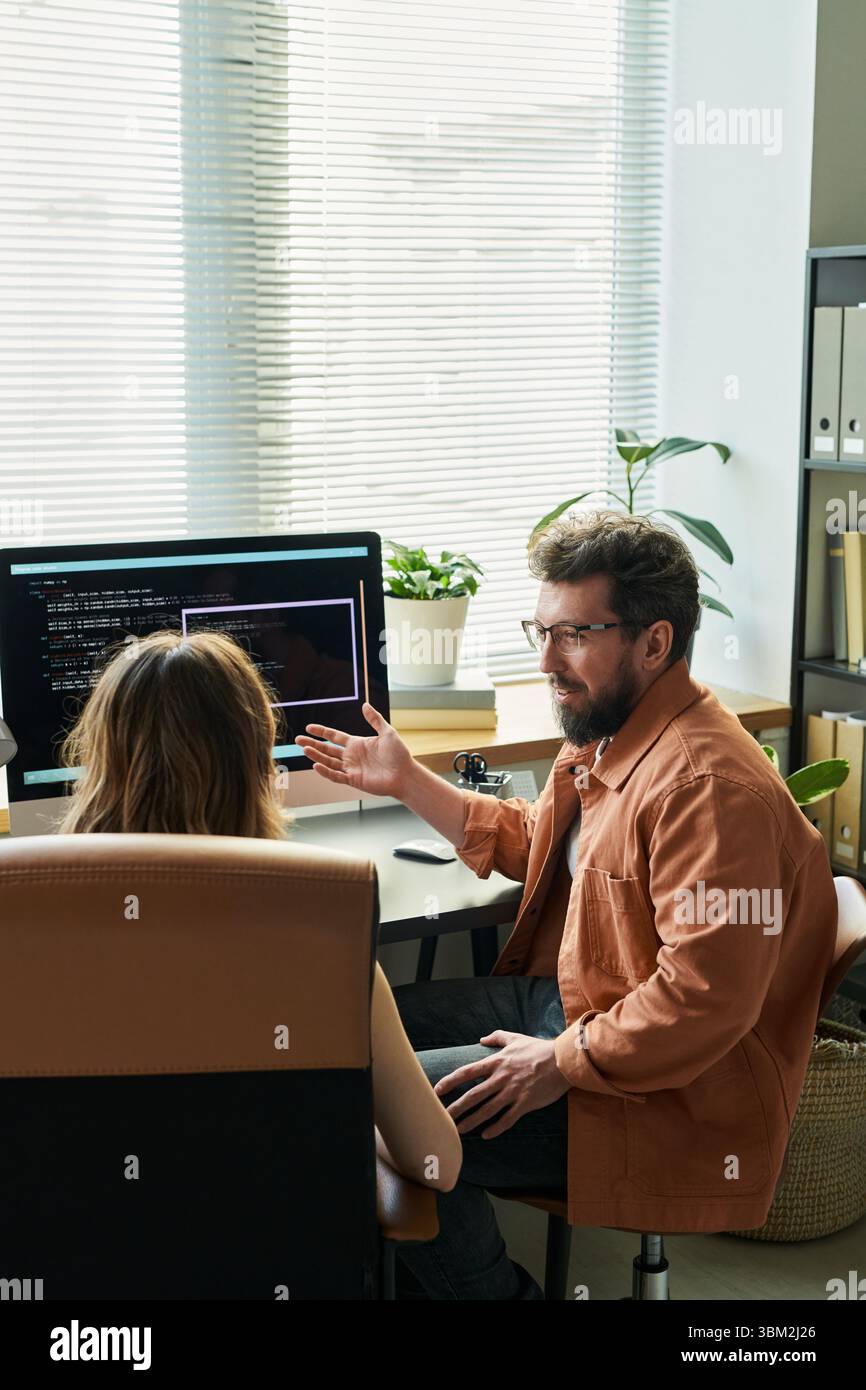 Caucasian man explaining programming hi-res stock photography and ...