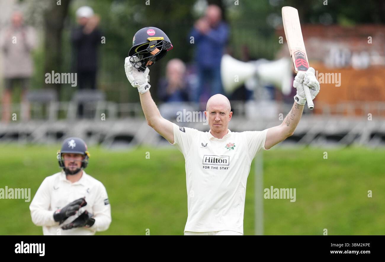Lancashire's Luke Wells celebrates his century against Kent, during the ...