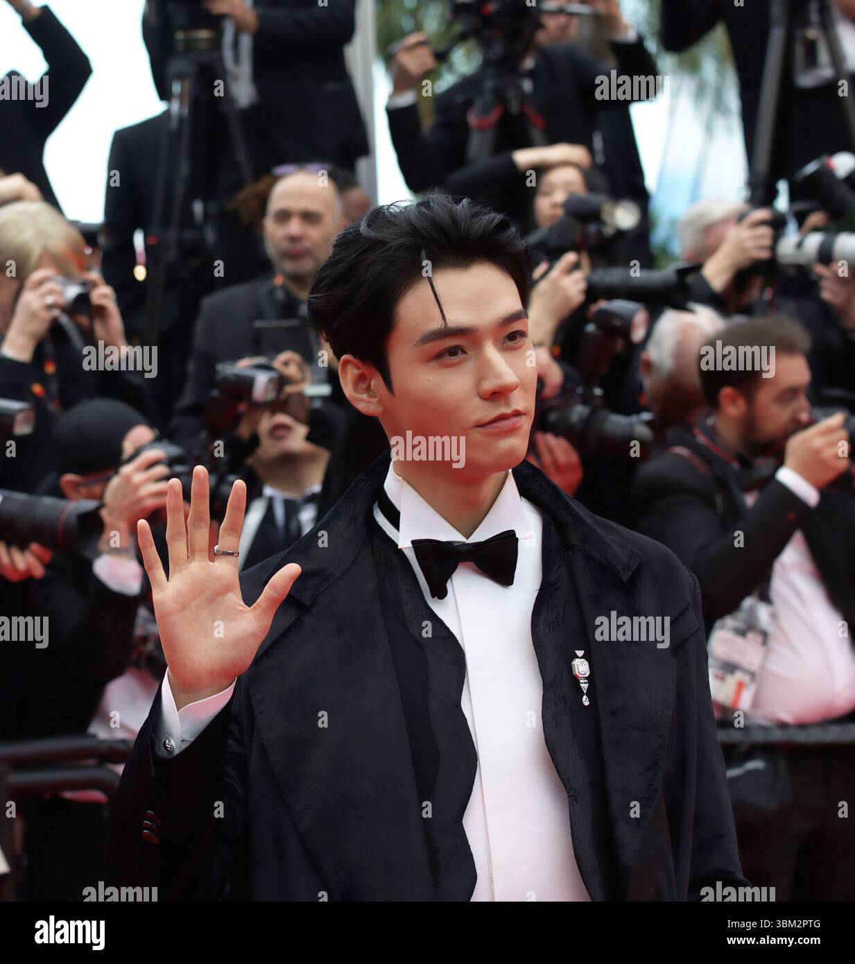 Chinese actor Gong Jun on the red carpet at the Cannes Film Festival ...