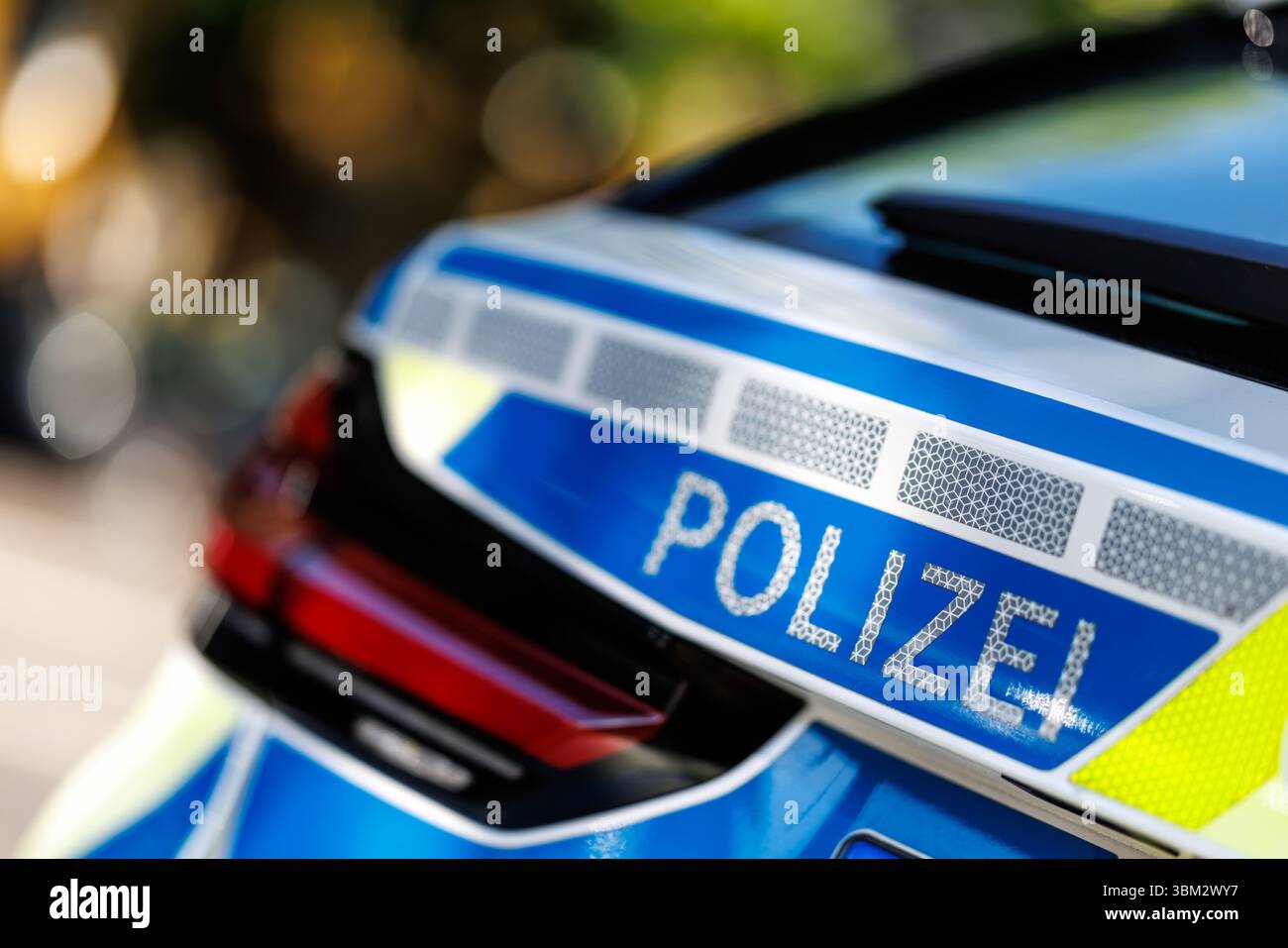 24 June 2025, Bavaria, Munich: The lettering "Polizei" can be seen on a ...