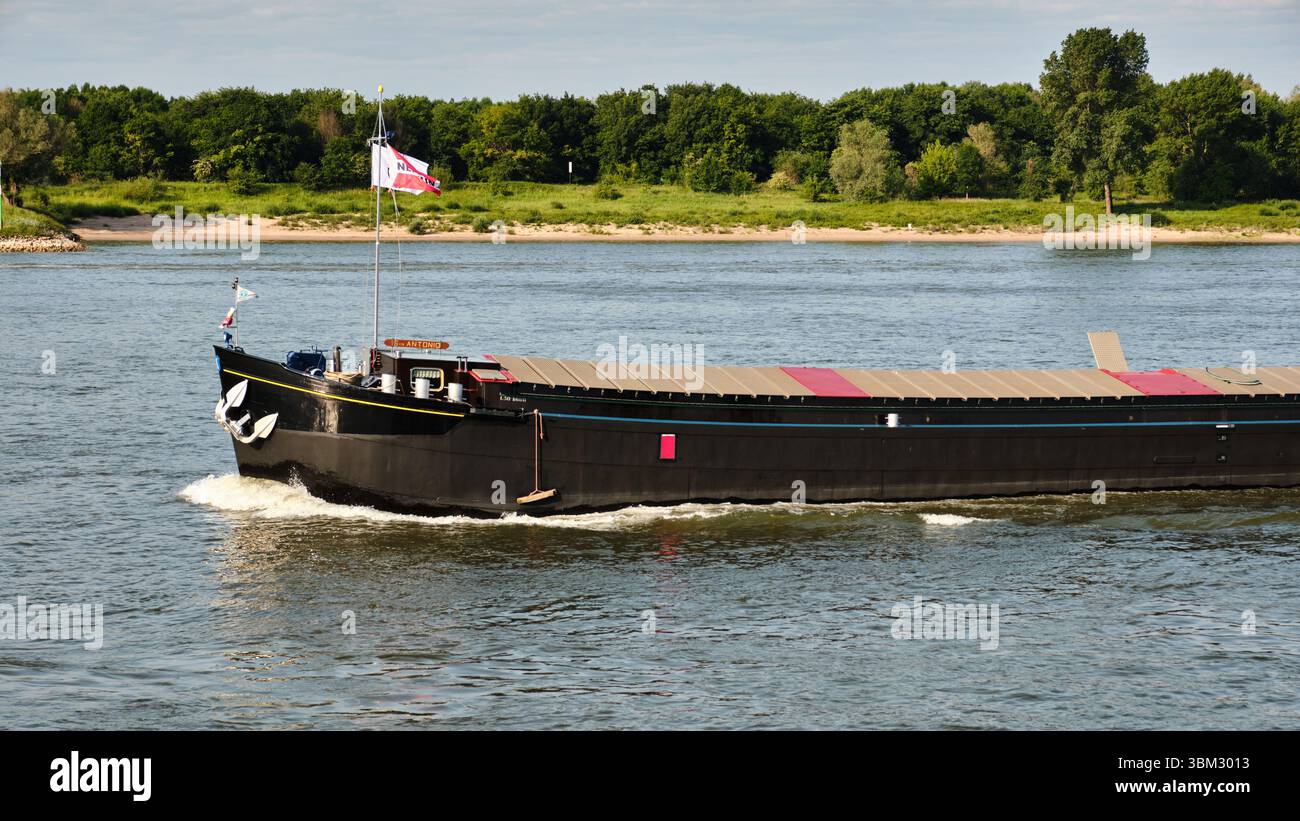 June 3, 2025 - Tolkamer-Netherlands: A small vintage inland cargo barge ...