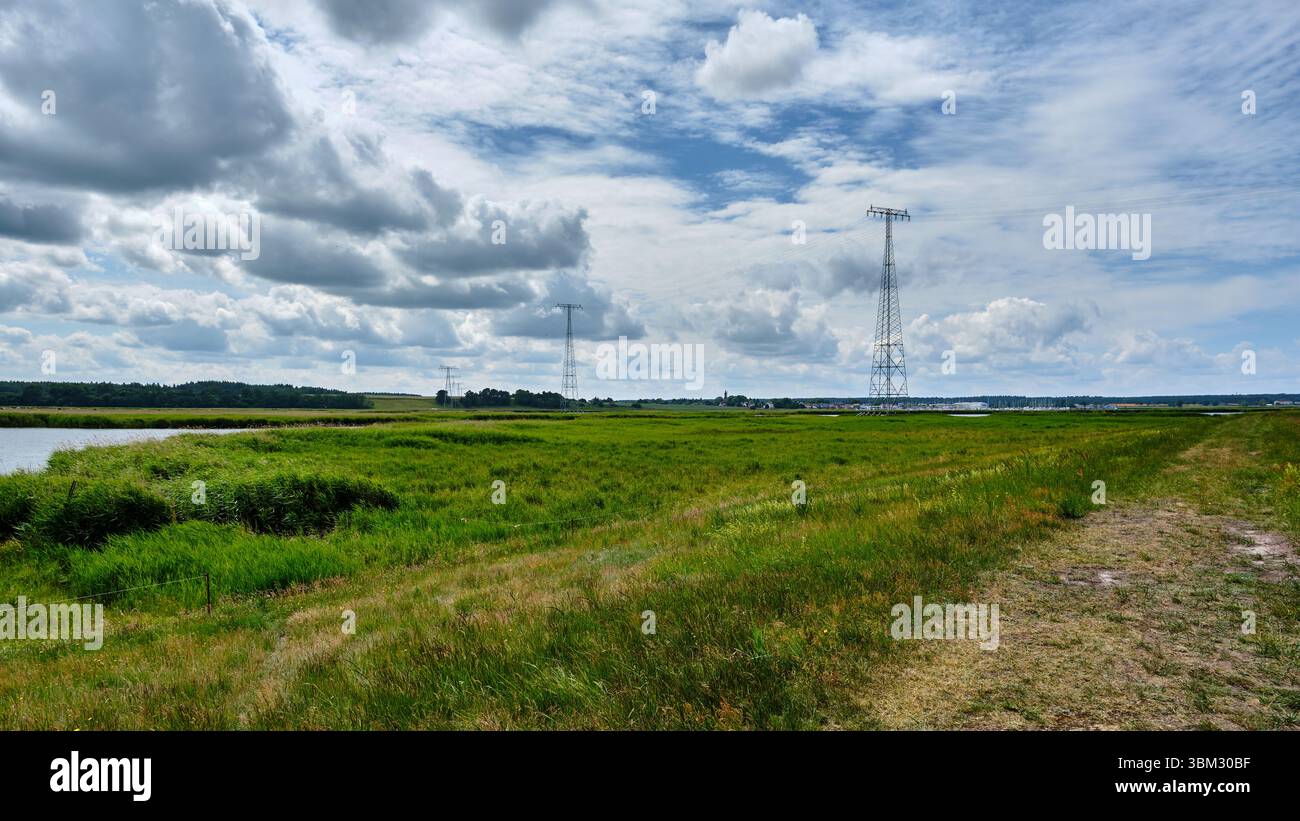View from Usedom towards the mainland with tall high voltage pylons ...