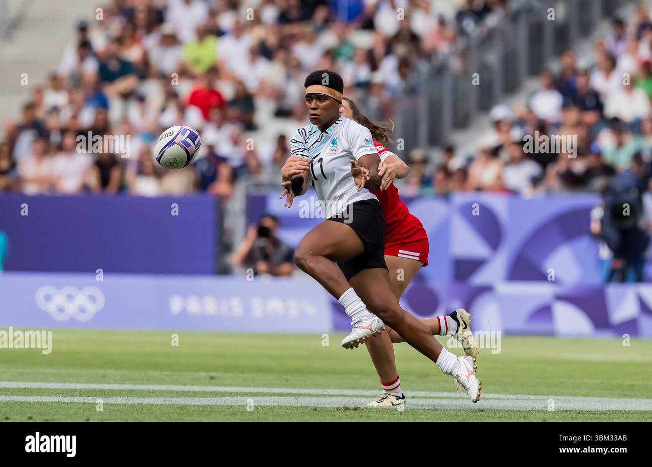 Fiji back MARIA ROKOTUISIGA (FIJ)) (11) competes in the Women's Rugby ...