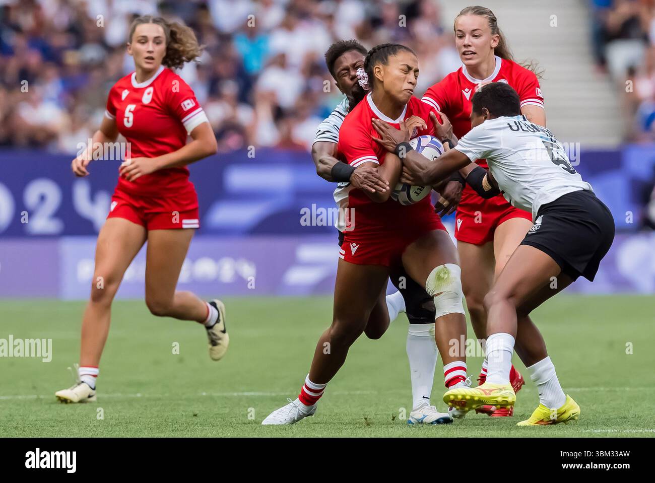 Canada back KEYARA WARDLEY (CAN) (12) competes in the Women's Rugby ...