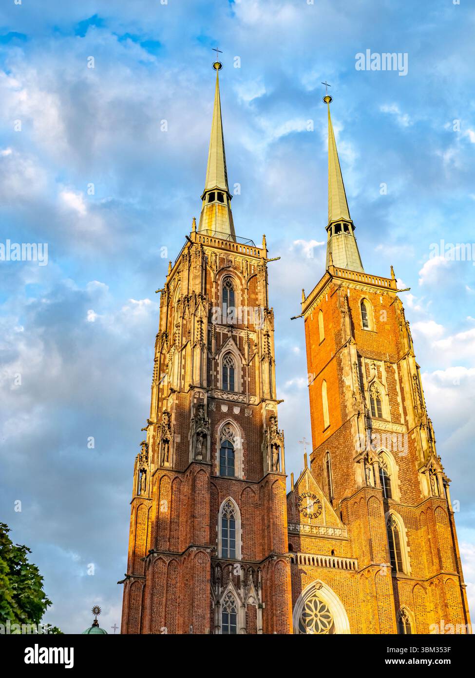 Beautiful view of a Gothic brick Collegiate Church of the Holy Cross ...