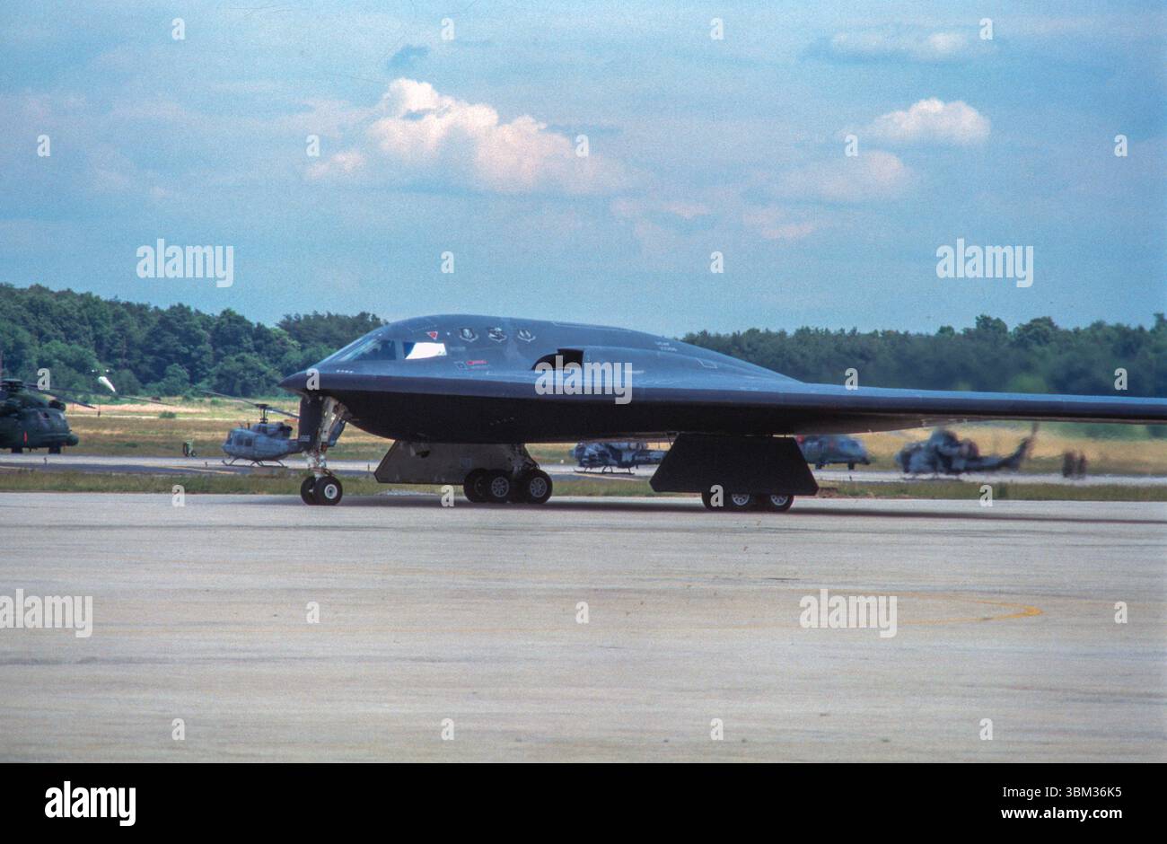 A Northrop B-2 Spirit, a stealth strategic heavy bomber, arrives at Andrews Air Force Base in ...