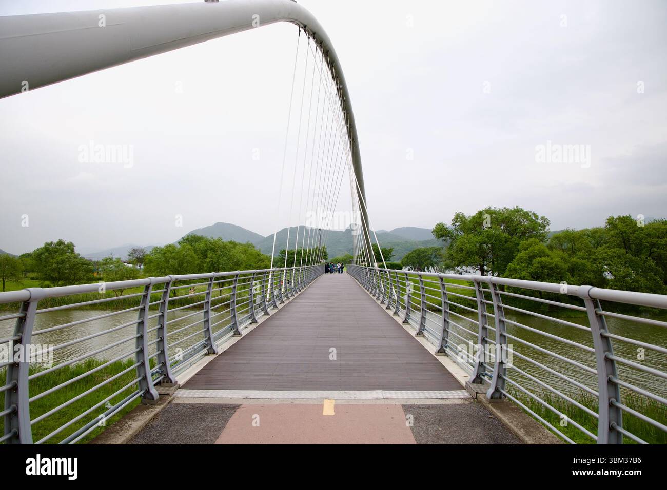 Namyangju City, South Korea - May 19th 2025: Baetnari Bridge, a curved ...