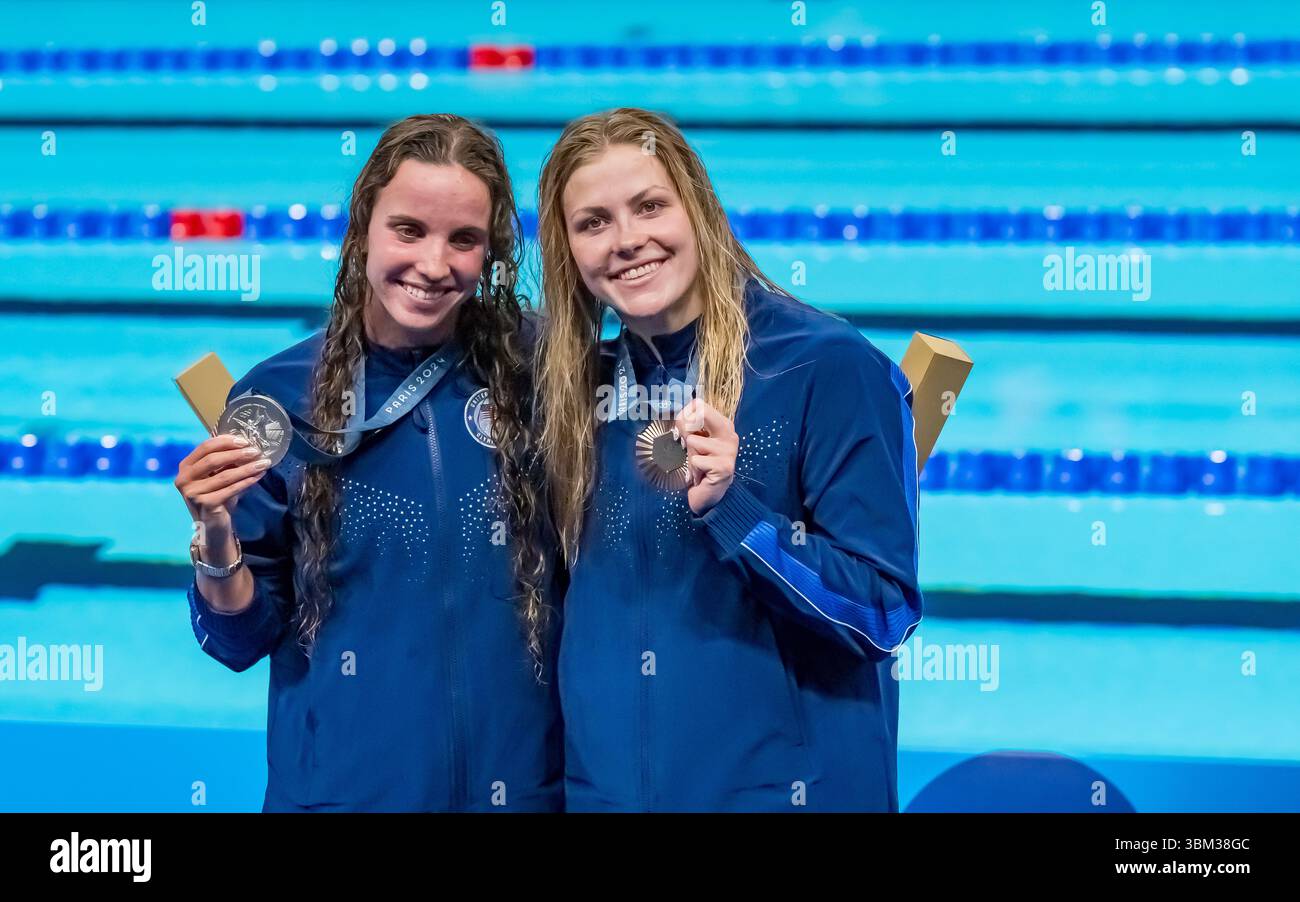 REGAN SMITH (USA) and KATHARINE BERKOFF (USA) show off their silver and ...
