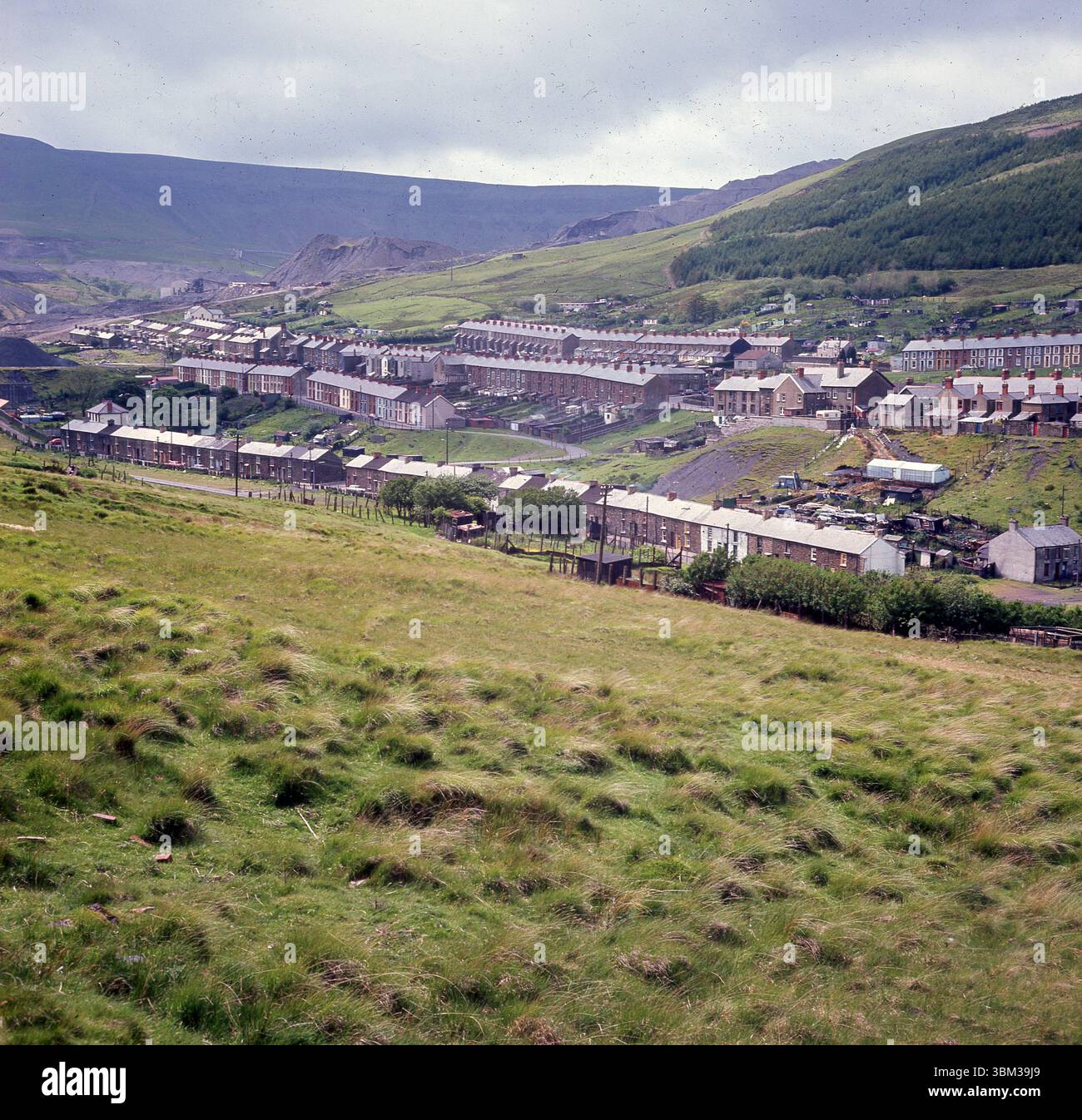 1960s, historical, a view from high land looking down over Cwm Parc village and housing in the ...