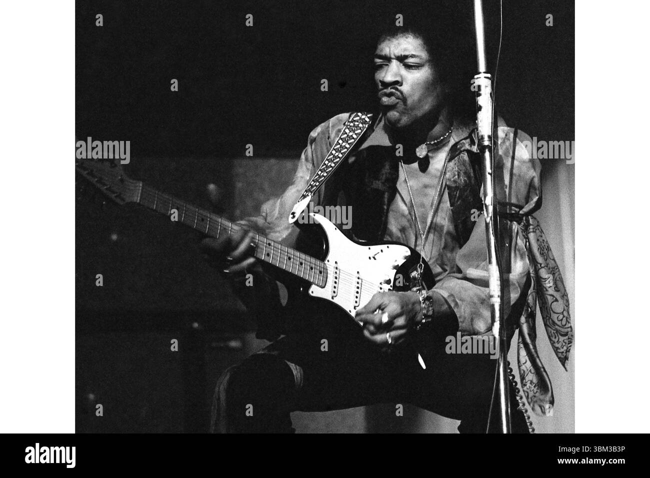 FILE - Jimi Hendrix performs on tour at the Rheinhalle in Dusseldorf ...