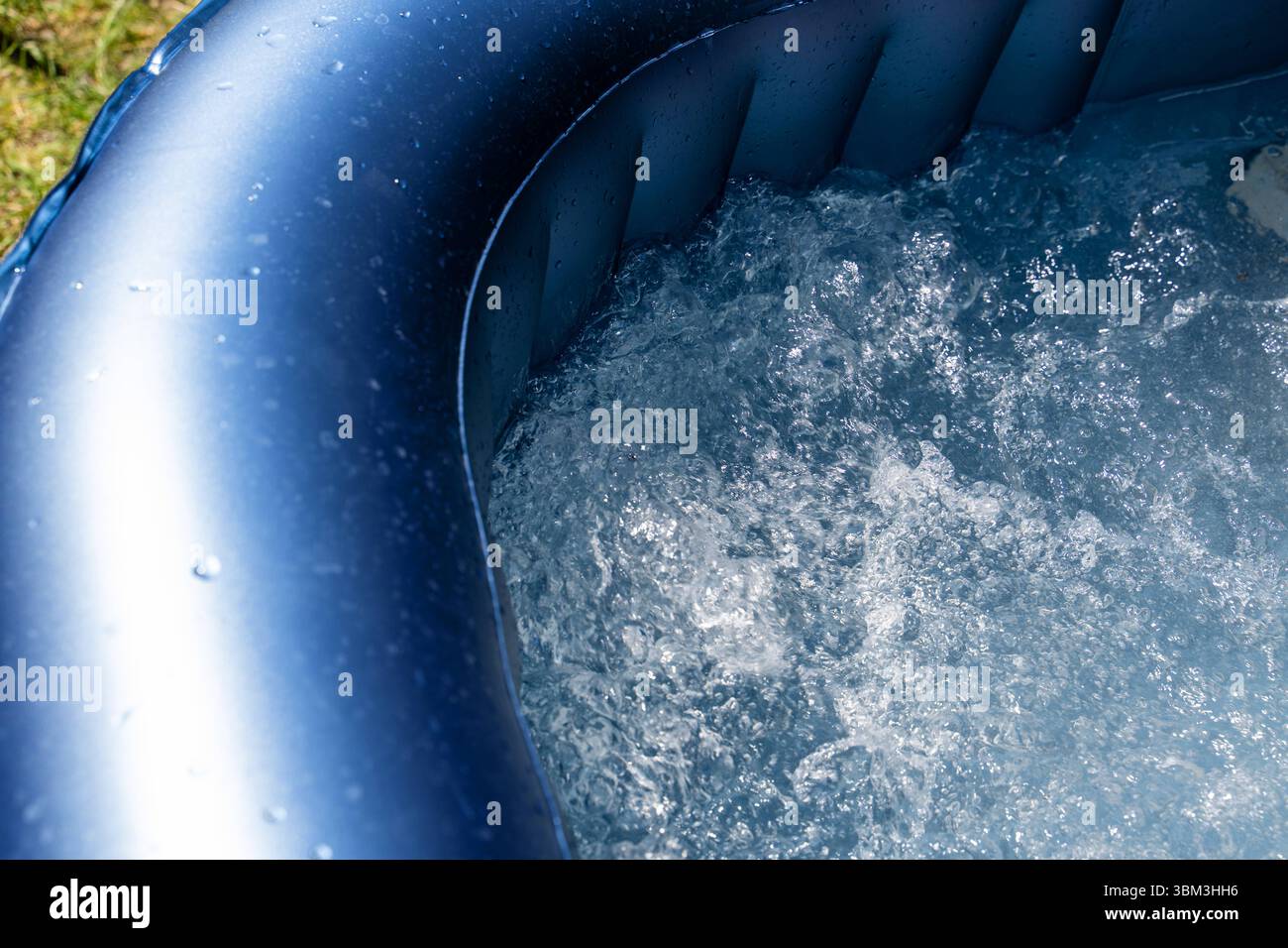 Bavaria, Germany - June 24, 2025: Close-up of a pool with bubbling ...