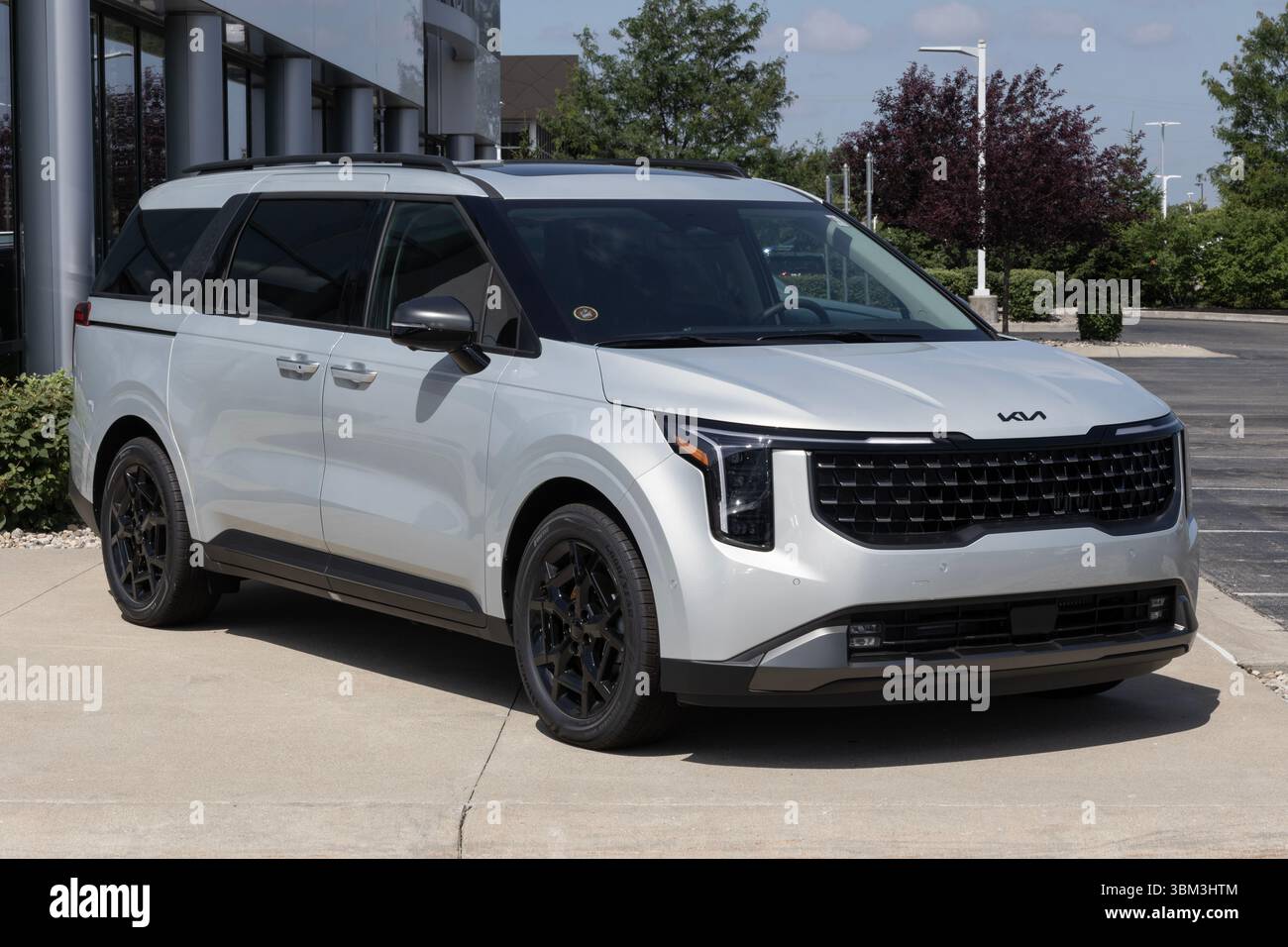 Avon - June 22, 2025: Kia Carnival Hybrid SX Prestige minivan display ...