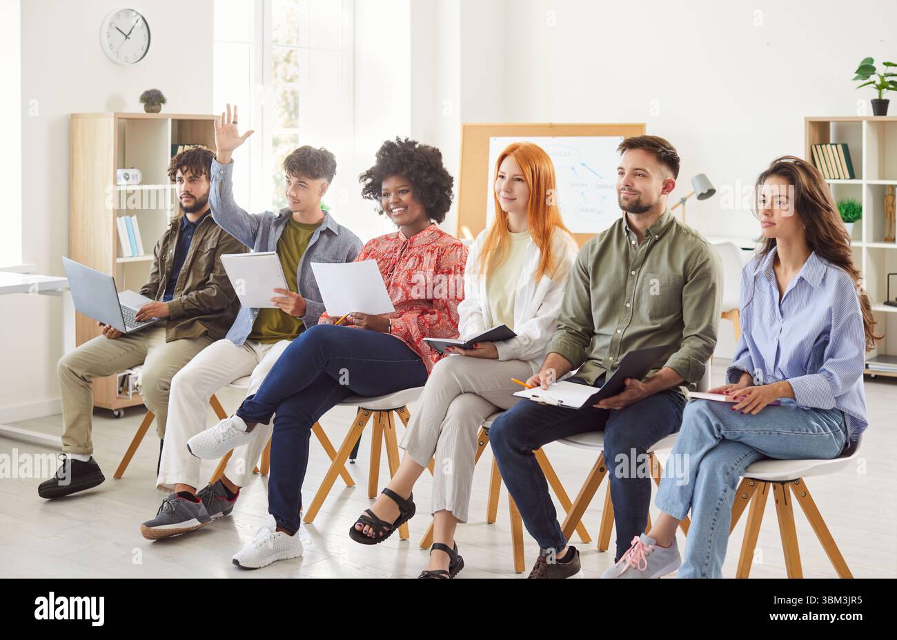 Business Team Asking Questions And Raising Hands During Office Meeting ...