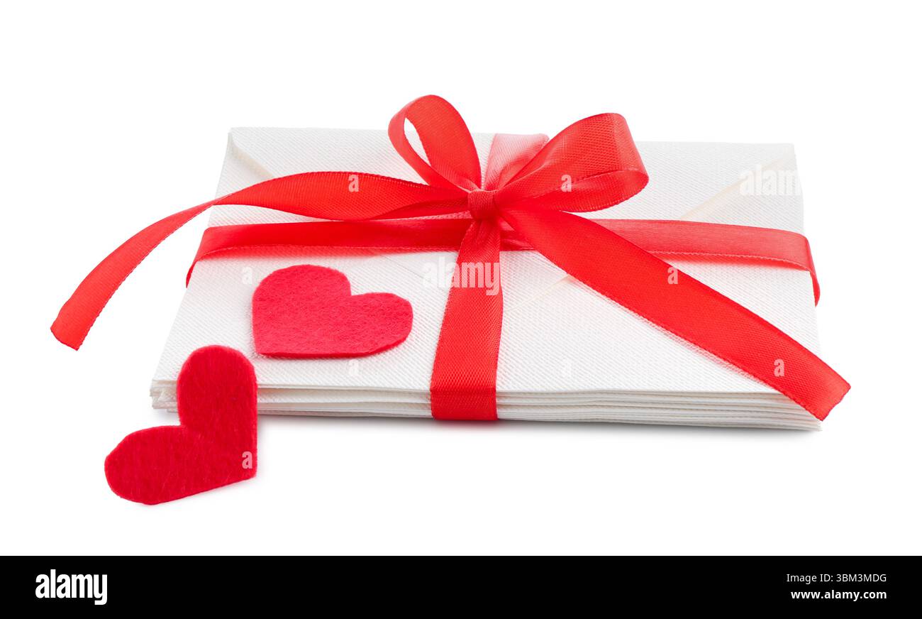 Stack of love letters and paper hearts isolated on white Stock Photo ...