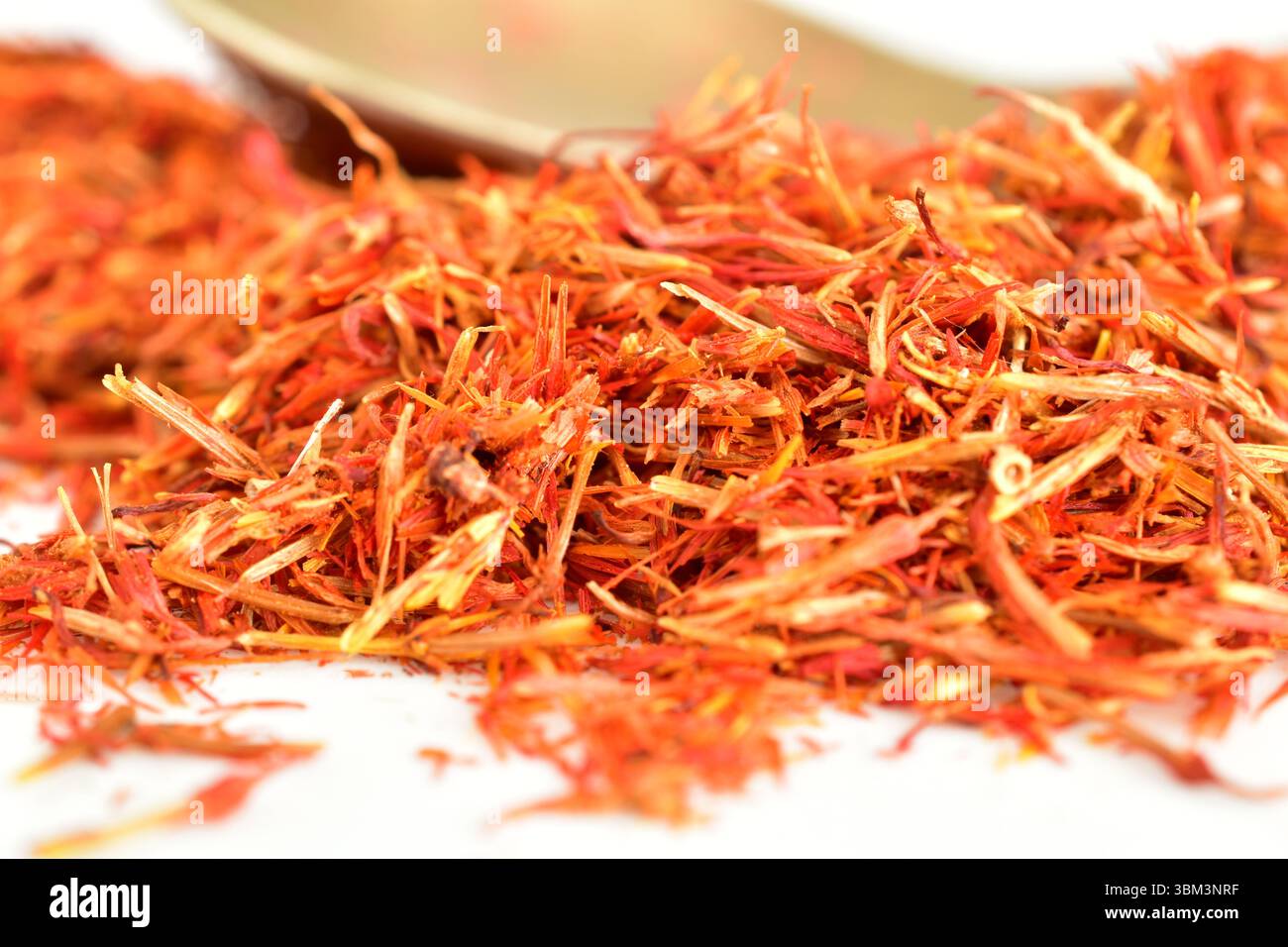 Dry ground aromatic spice saffron used in cooking on the table Stock ...