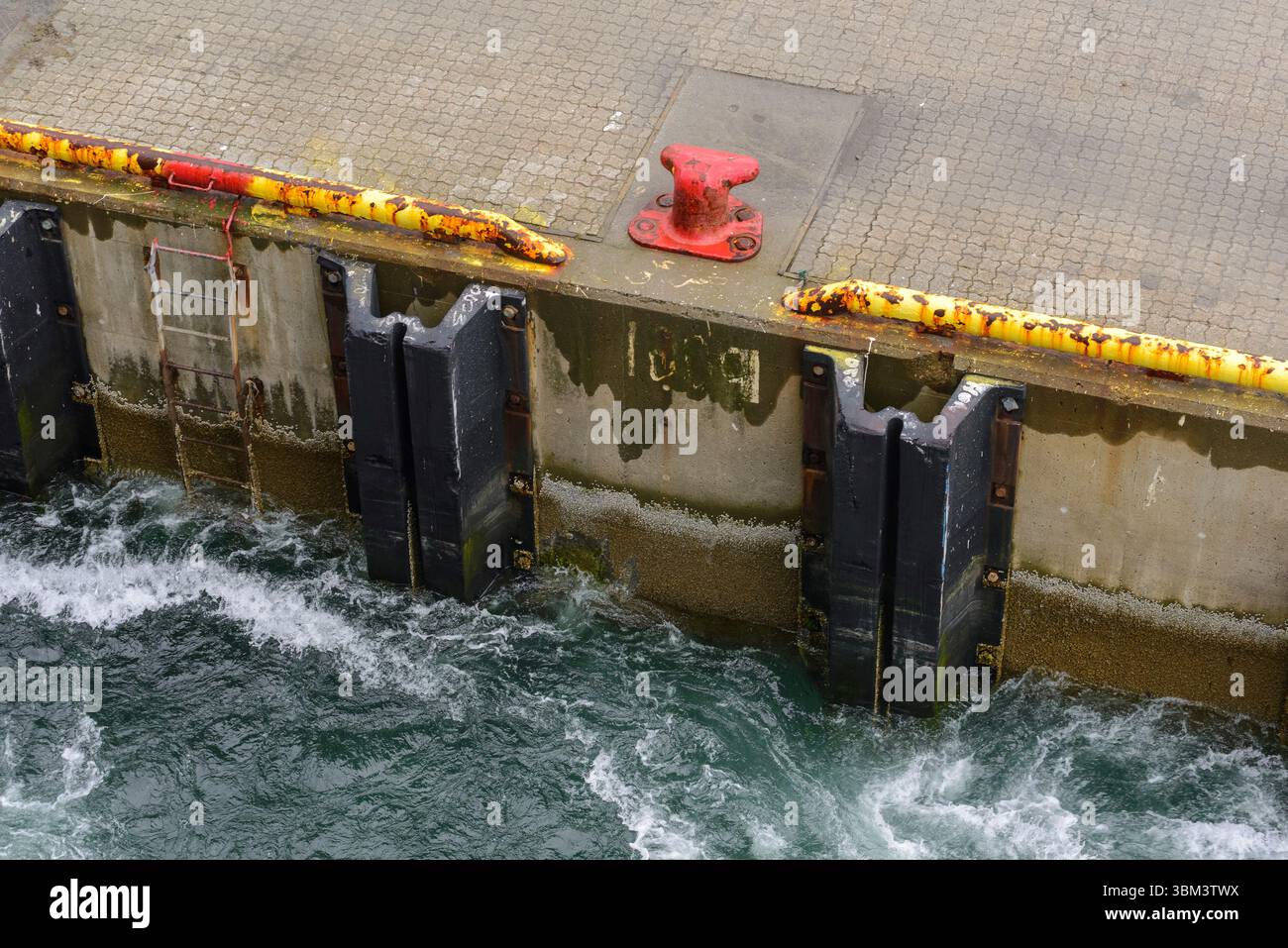 Port buffers, mooring point, wash from ship Stock Photo - Alamy