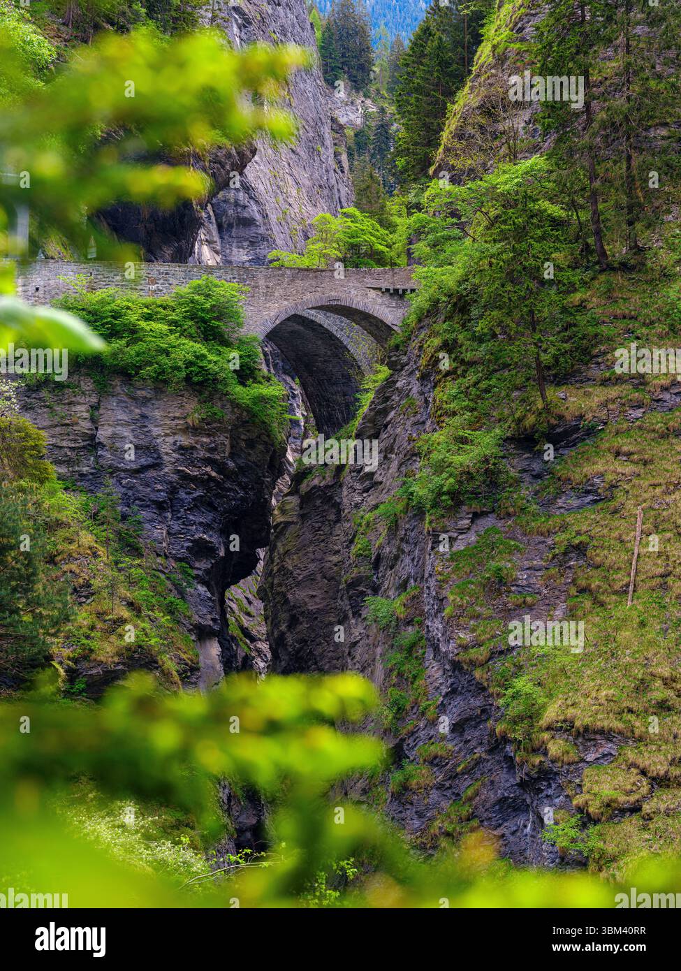 The old bridge crossing the gorge. The Viamala Gorge in the nature park ...