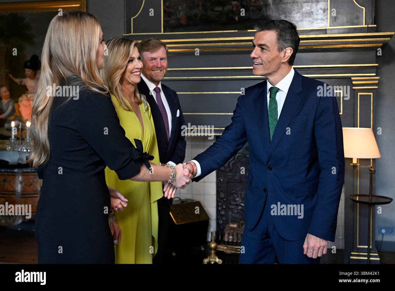Spain's Prime Minister Pedro Sanchez, right, is welcomed by Netherland ...