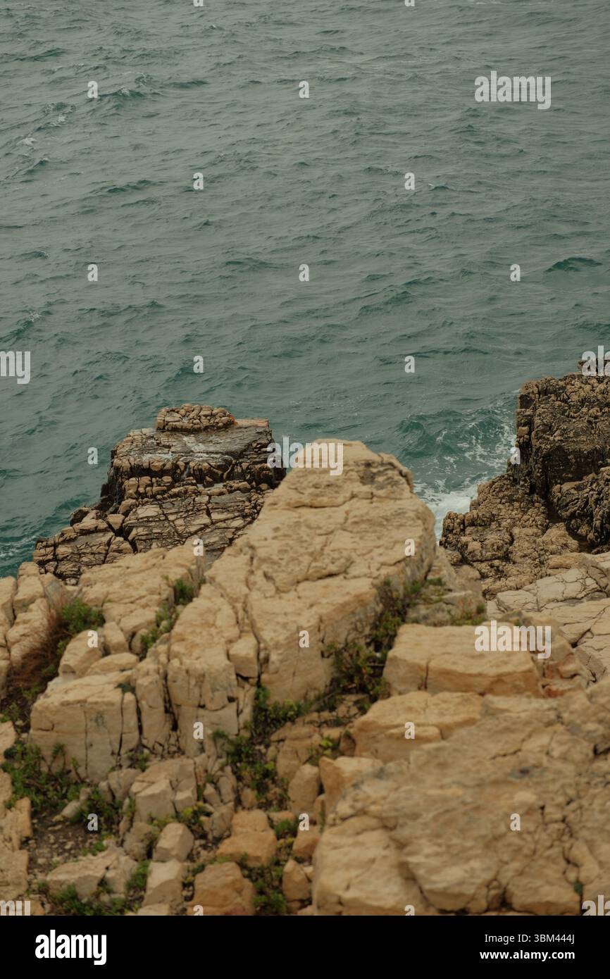Close-up view of a rugged Adriatic shoreline with dry coastal ...