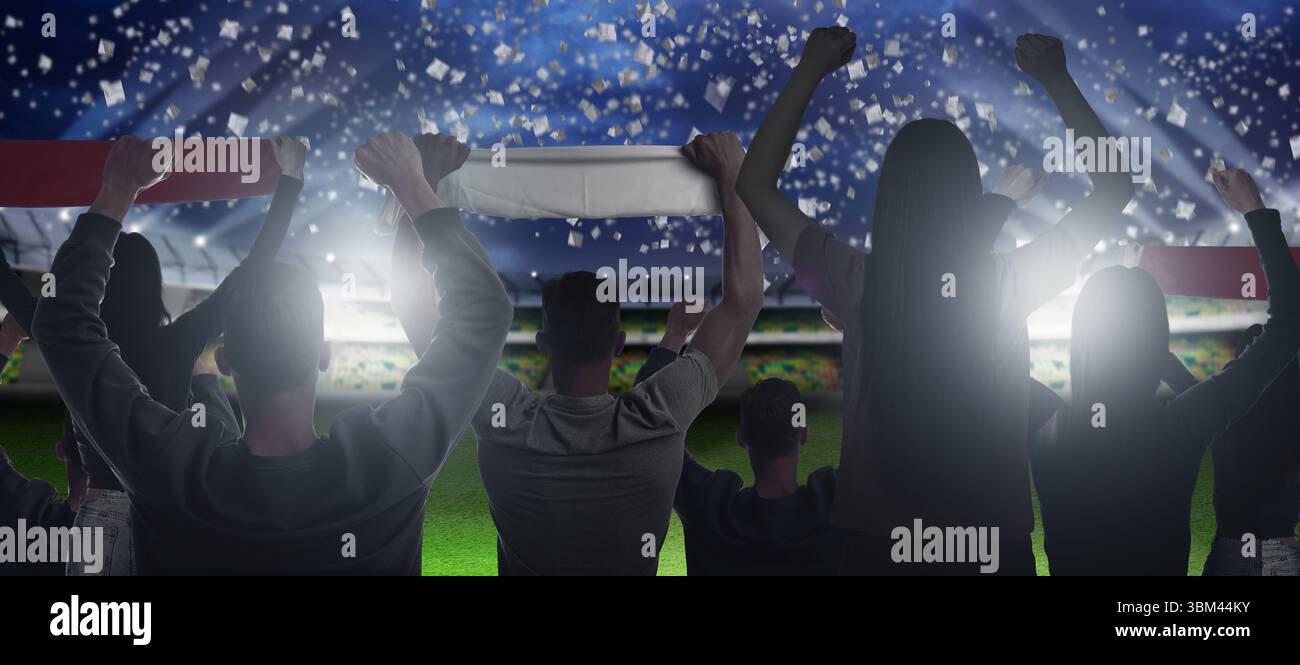 Excited fans celebrating victory in spectator area under falling ...