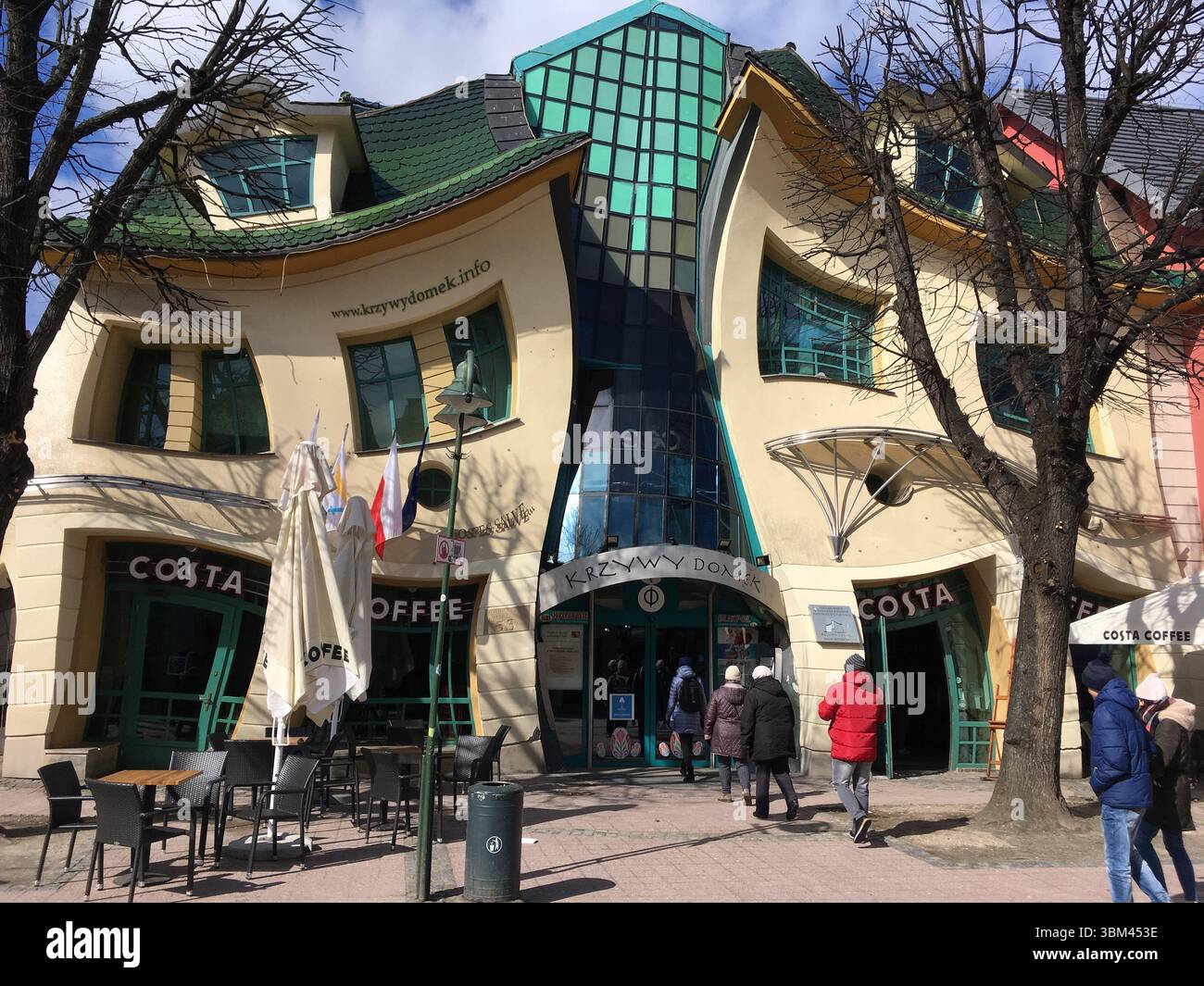 The Crooked House (Krzywy Domek) in Sopot—an iconic, warped glass-and ...