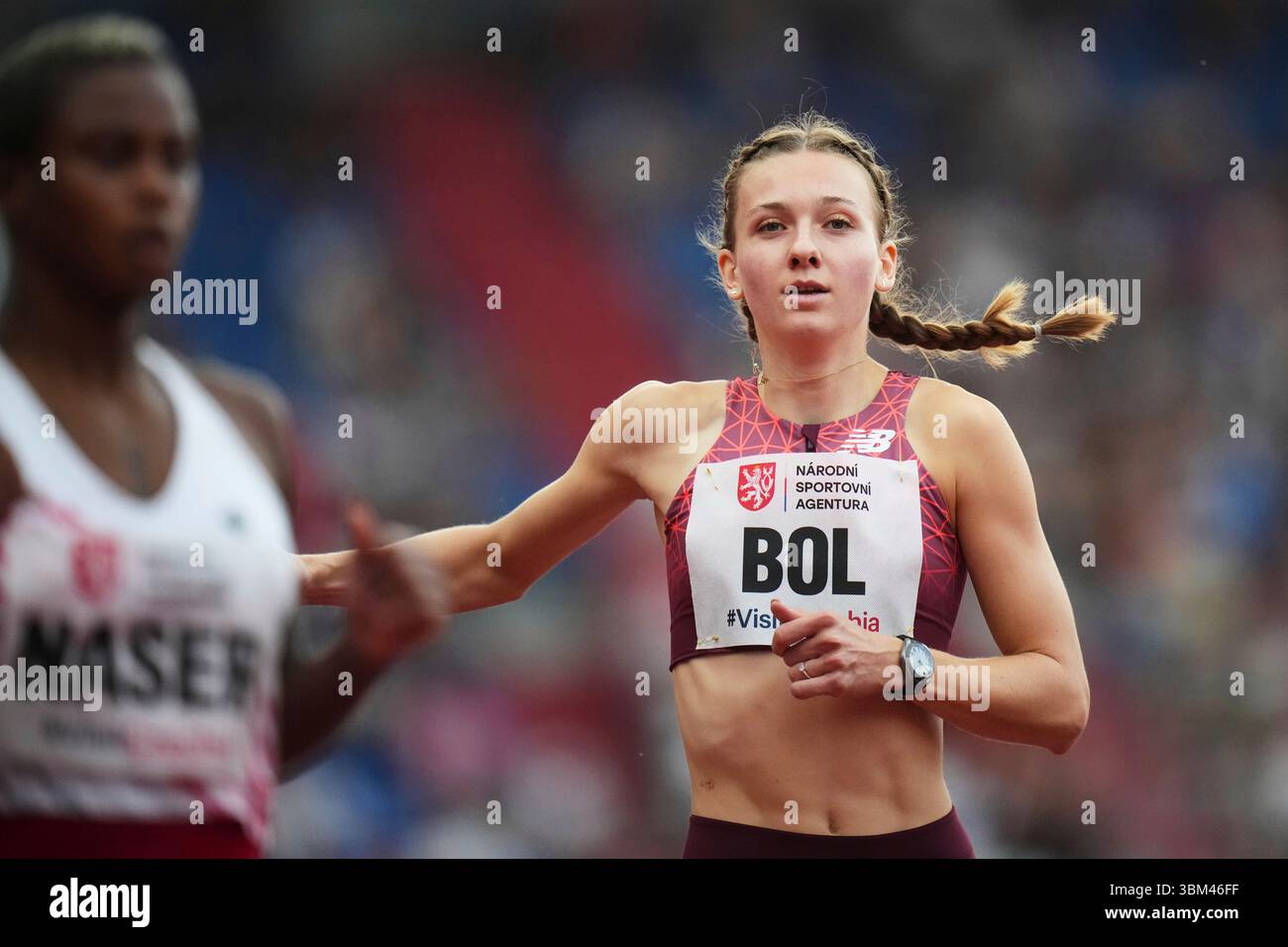 Femke Bol, of the Netherlands, finishes third, behind winner Salwa Eid ...