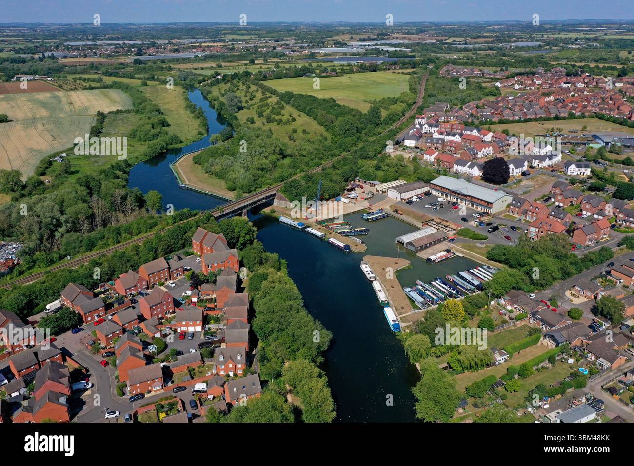 Aerial drone view of River Avon with Evesham Weir and lock ...