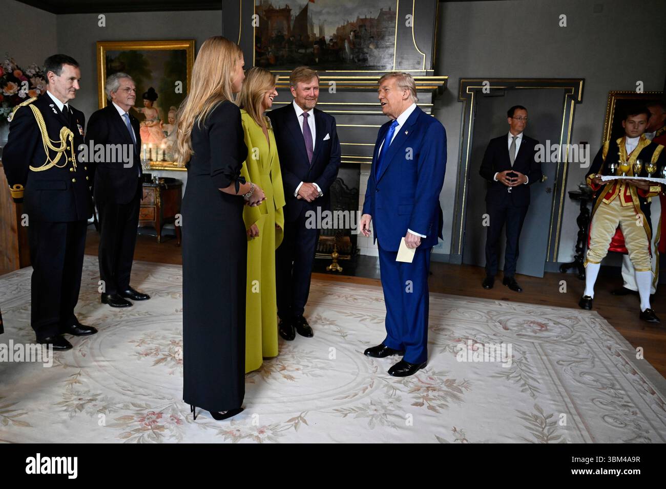 President Donald Trump, center, is welcomed by Netherland's King Willem ...