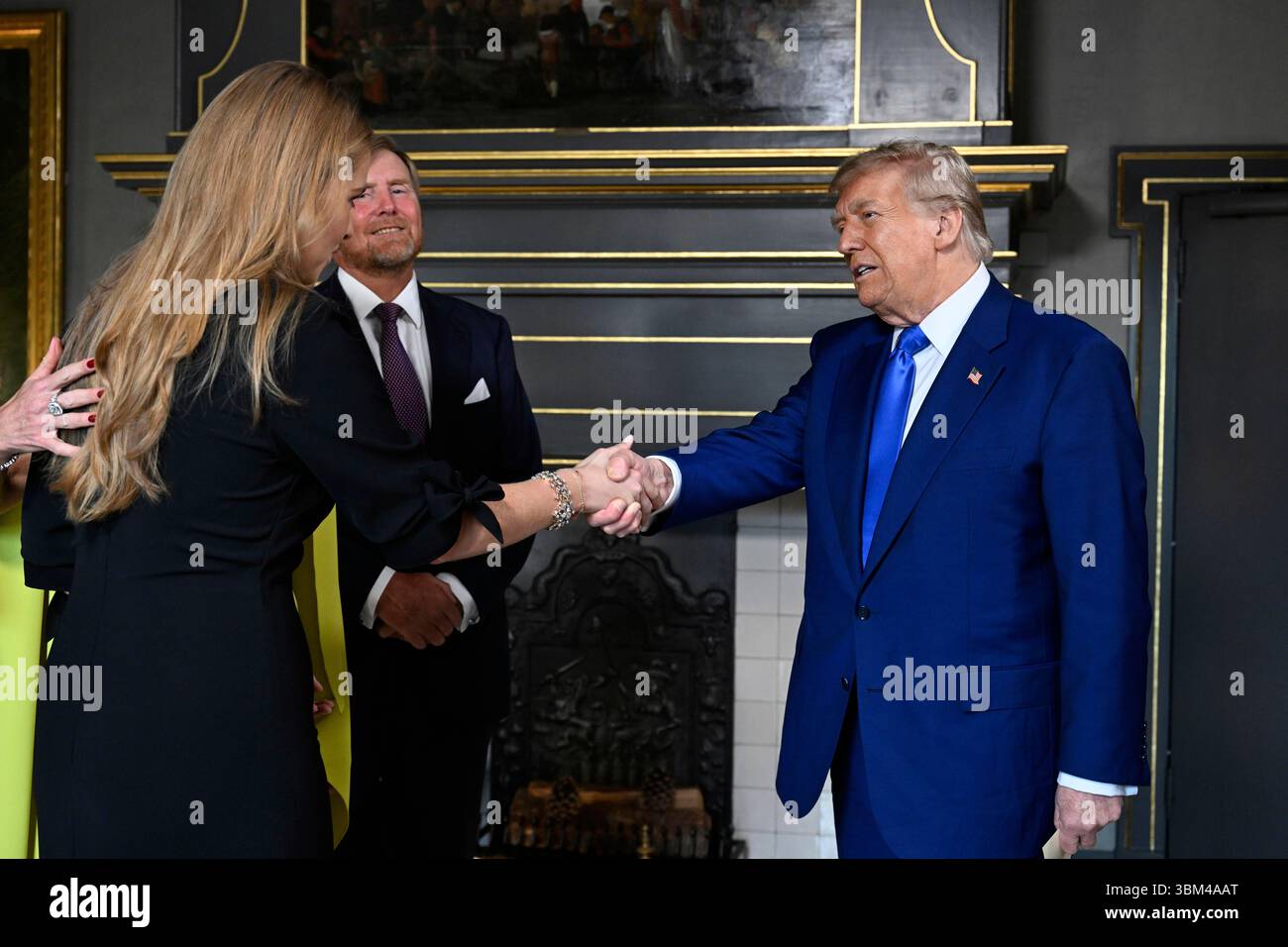 President Donald Trump, center, is welcomed by Netherland's King Willem ...
